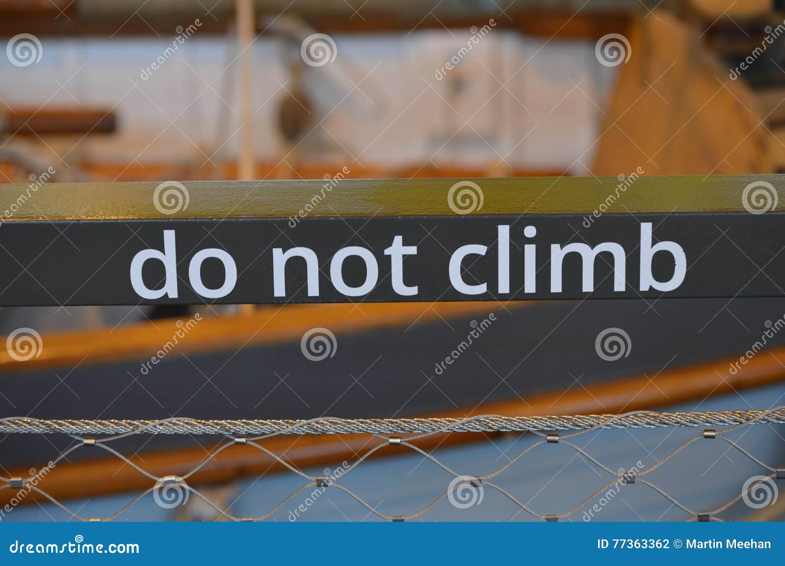 Do Not Climb Sign Board In The Grass And On The Slope Stock Photography ...