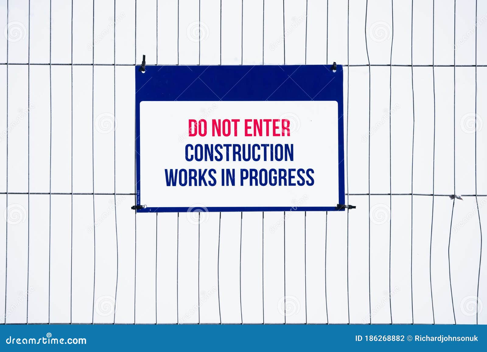 Do Not Enter Construction in Progress Sign on Fence Stock Photo - Image ...