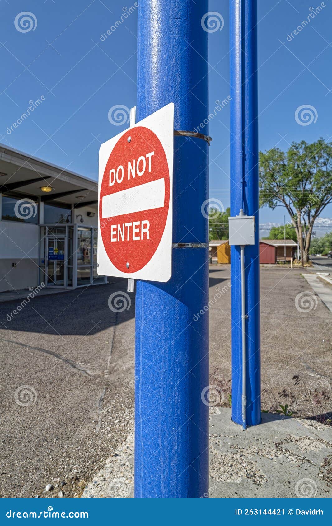 A Do Not Enter Sign on a Blue Pole Stock Image - Image of post, block ...