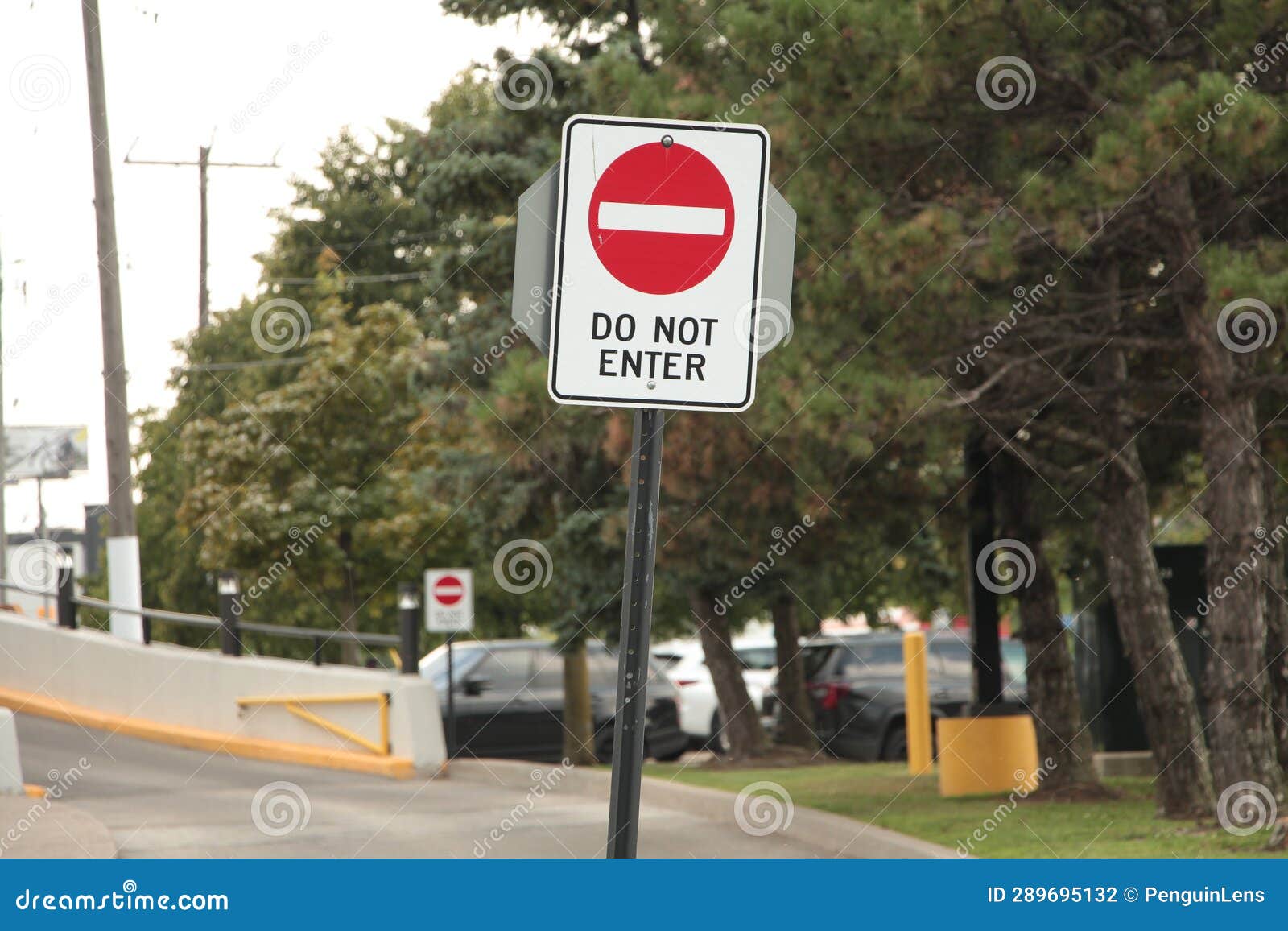 Do Not Enter Vertical Rectangle Sign Symbol on Post with Ramp Behind ...