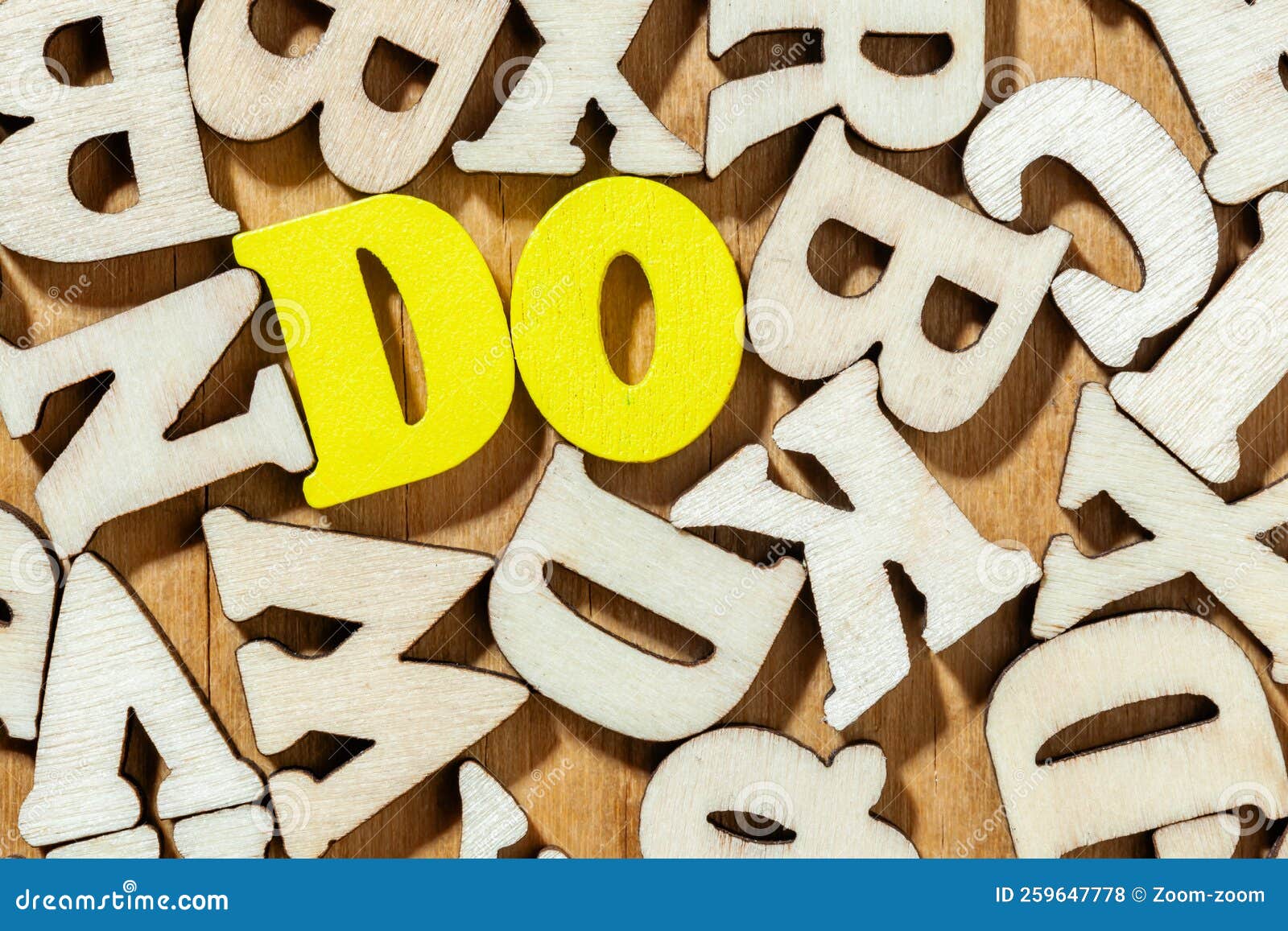 Do Word by Yellow Wooden Letters Stock Photo - Image of childhood ...