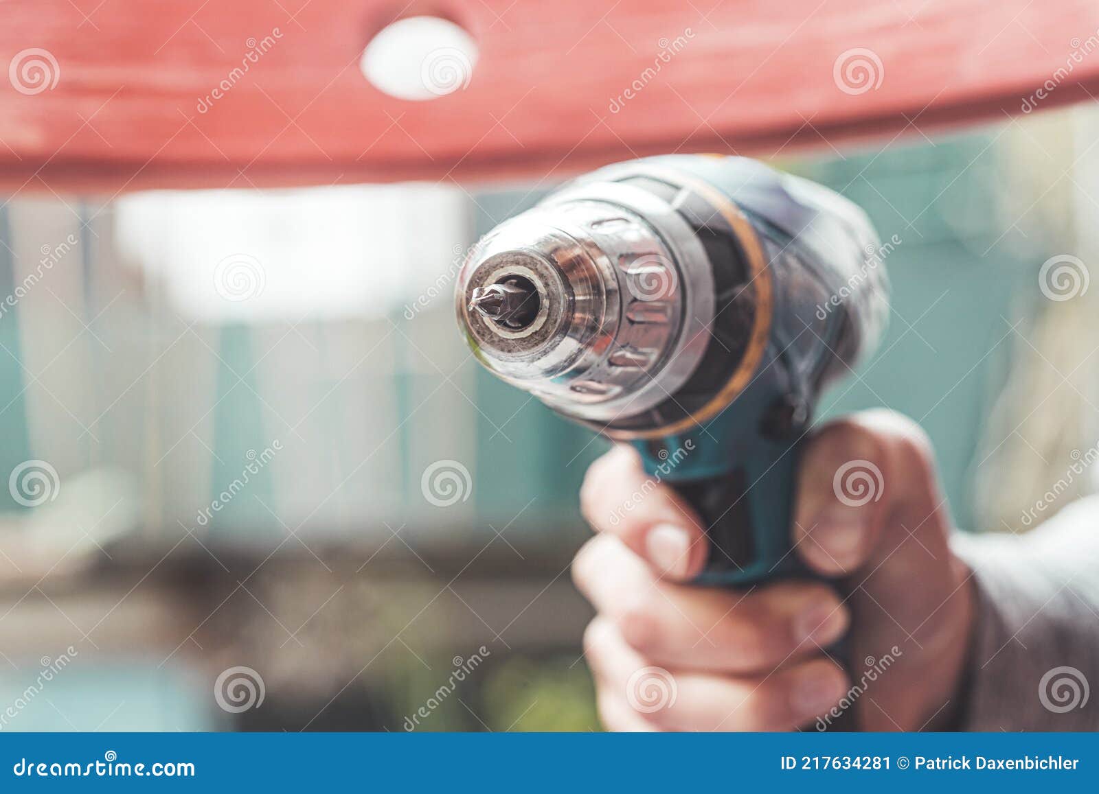 Do it Yourself: Home Handyman is Holding a Cordless Screwdriver ...