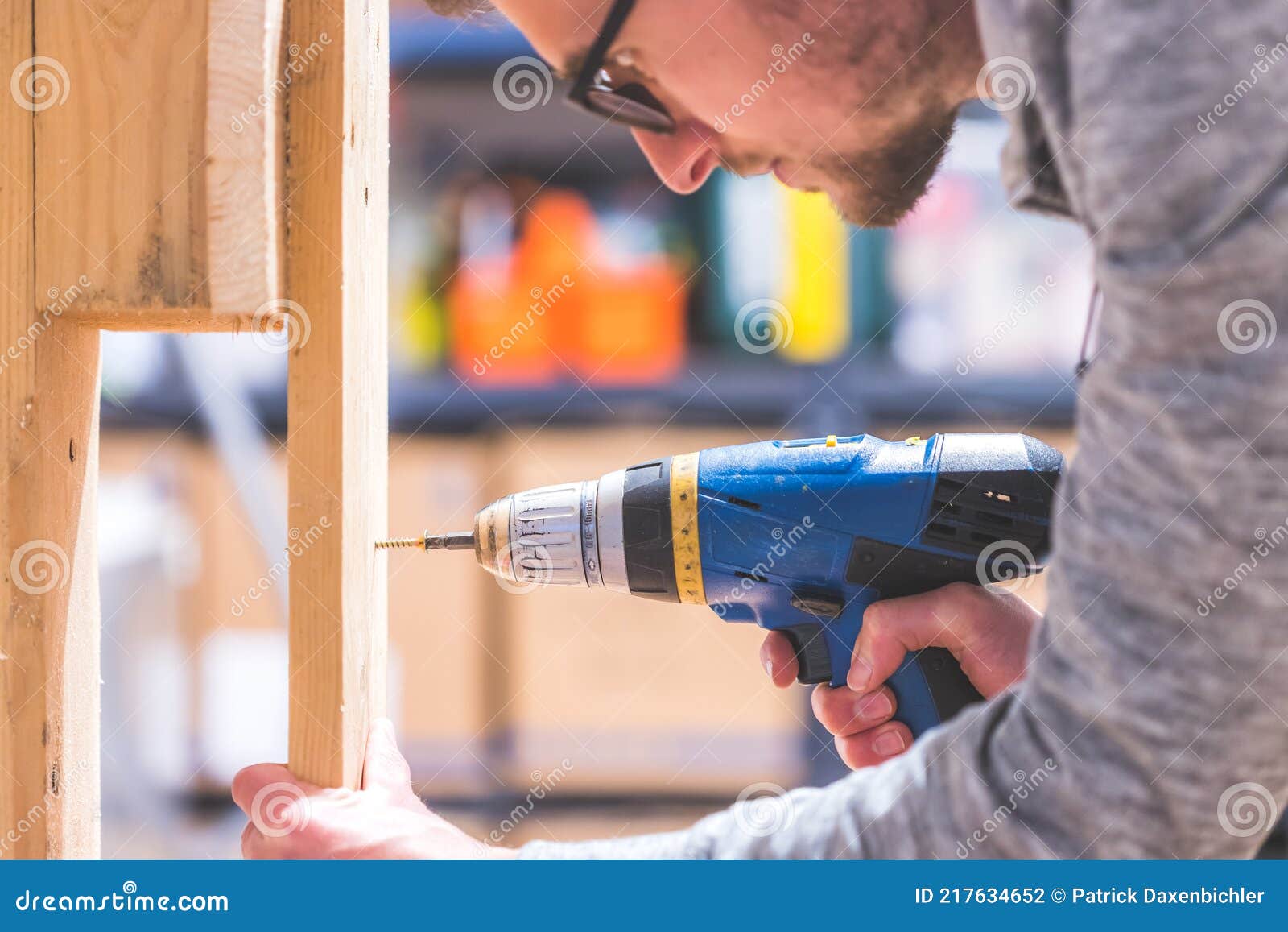 Do it Yourself: Home Handyman is Using a Cordless Screwdriver for ...