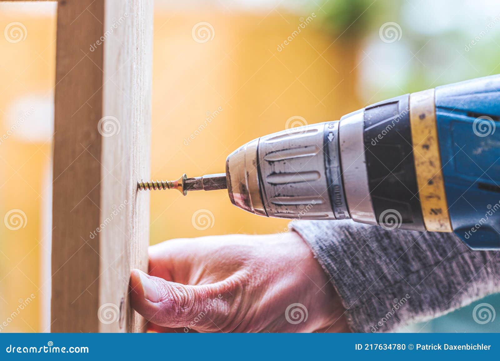 Do it Yourself: Home Handyman is Using a Cordless Screwdriver for ...