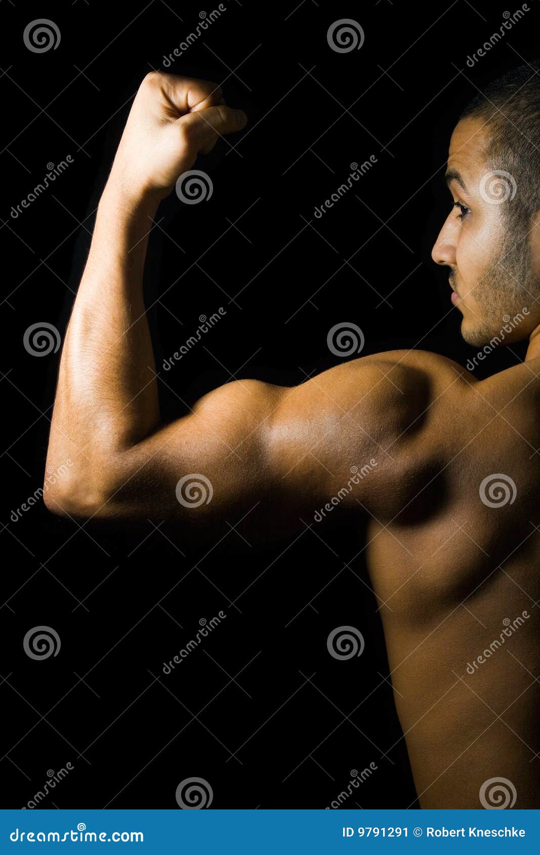 Doblar los músculos imagen de archivo. Imagen de espacio - 9791291