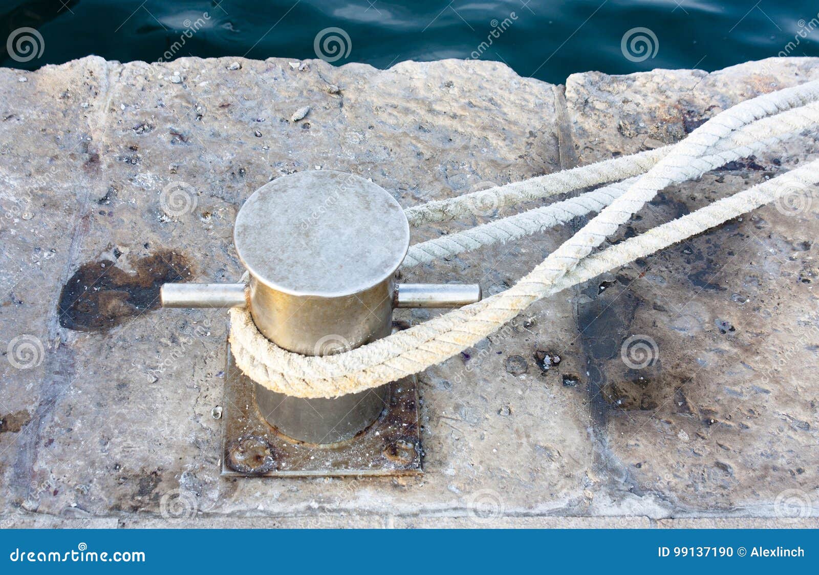 Dock Bollard on the Stone Pier Stock Photo - Image of industry, marine ...