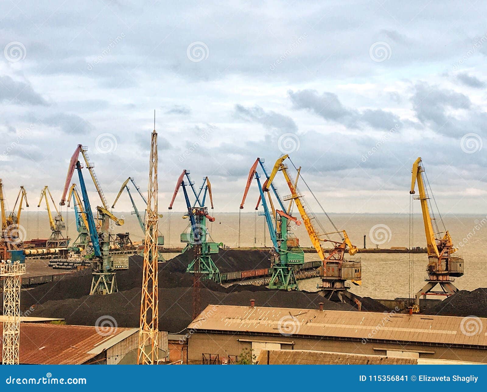 Dock Cranes in a Small Sea Port Stock Image - Image of cargo, crane ...