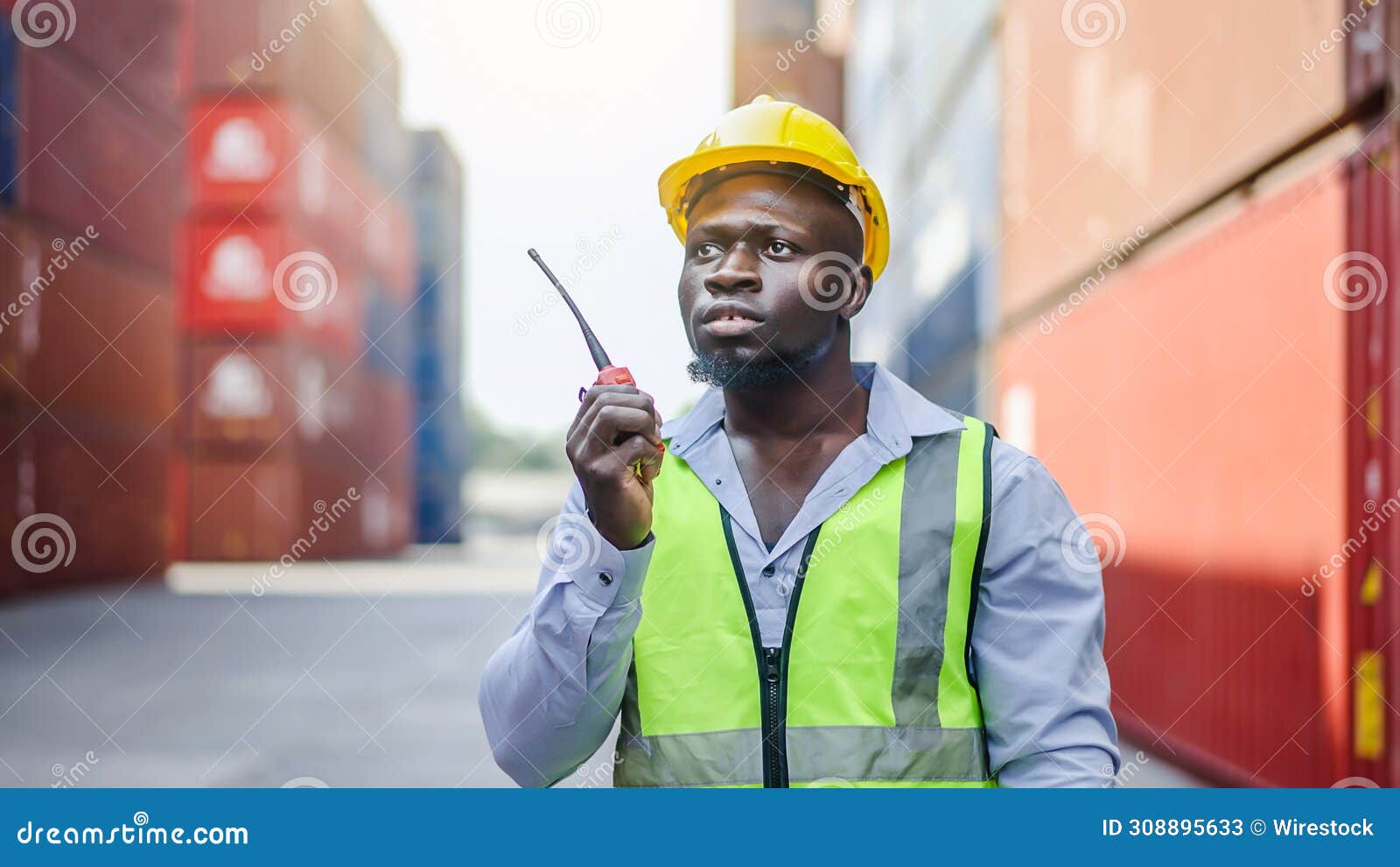Dock Foreman with a Radio Standing in Front of Cargo Containers Stock ...