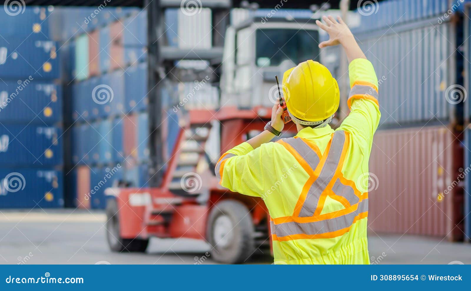 Dock Foreman with a Radio Standing in Front of Cargo Containers Stock ...