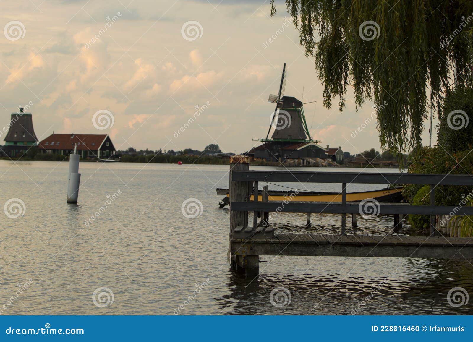 Dock in Front of Windmill Background Stock Photo - Image of rural ...