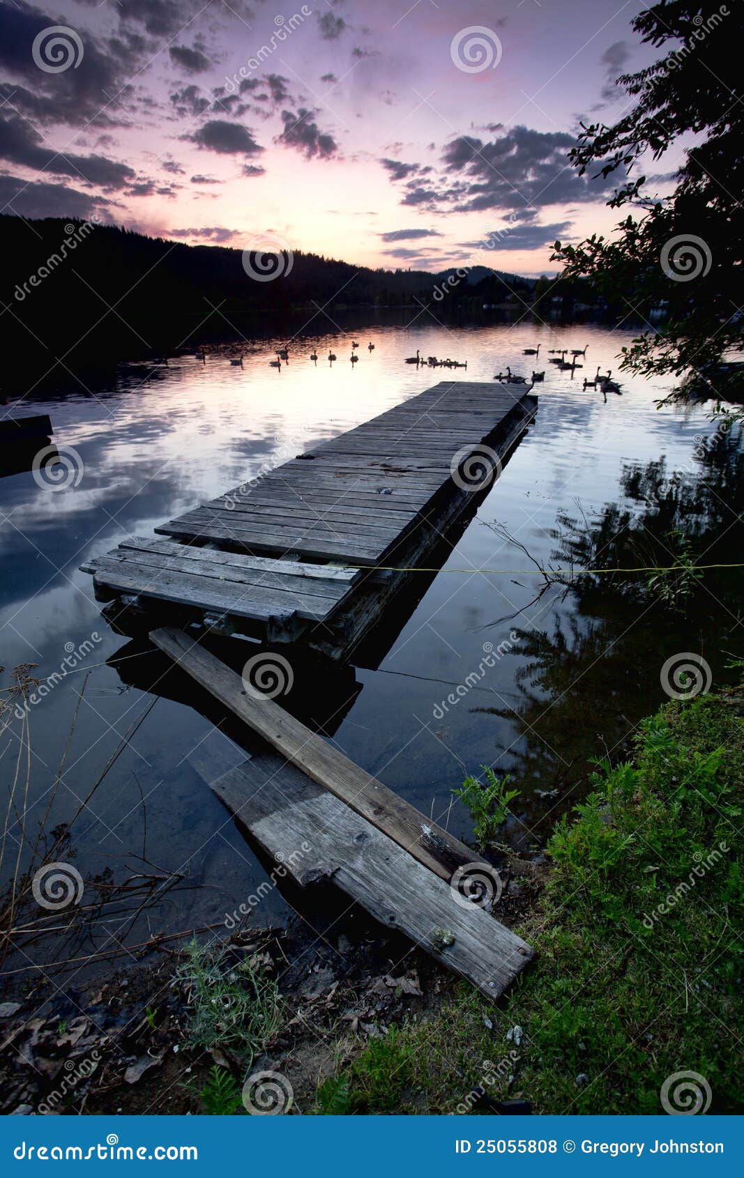 Dock on lake at sunset. stock photo. Image of scene, reflect - 25055808