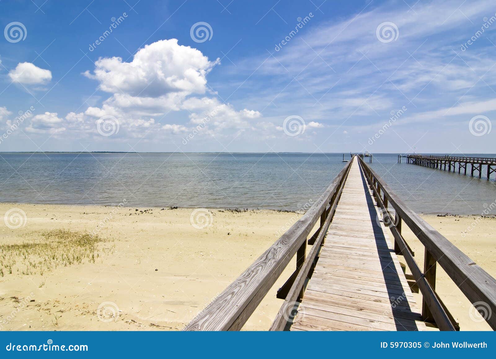 Dock, ocean, and clouds stock image. Image of vacation - 5970305