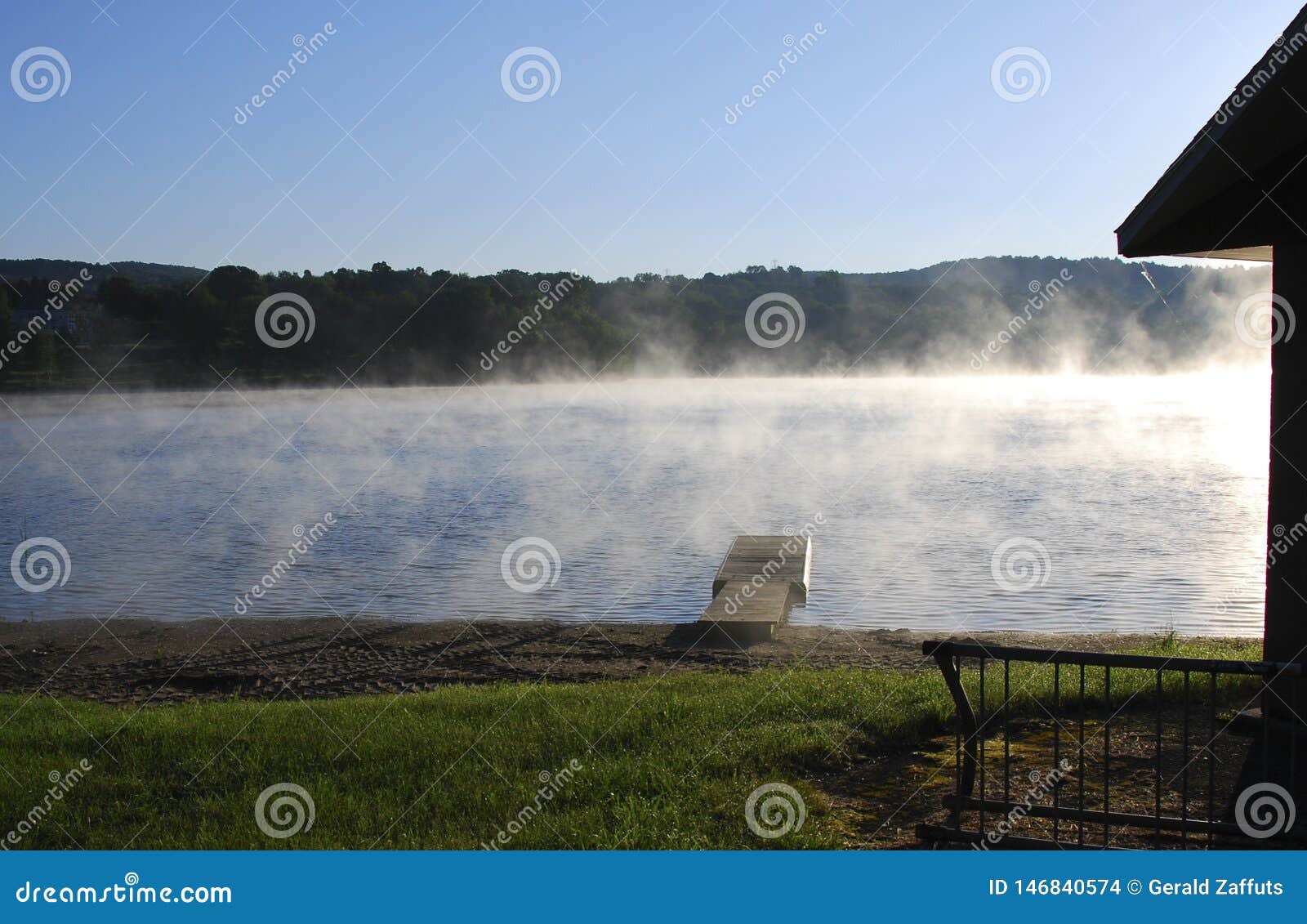 Dock at Sunrise with Mist on Lake Stock Photo - Image of peaceful ...