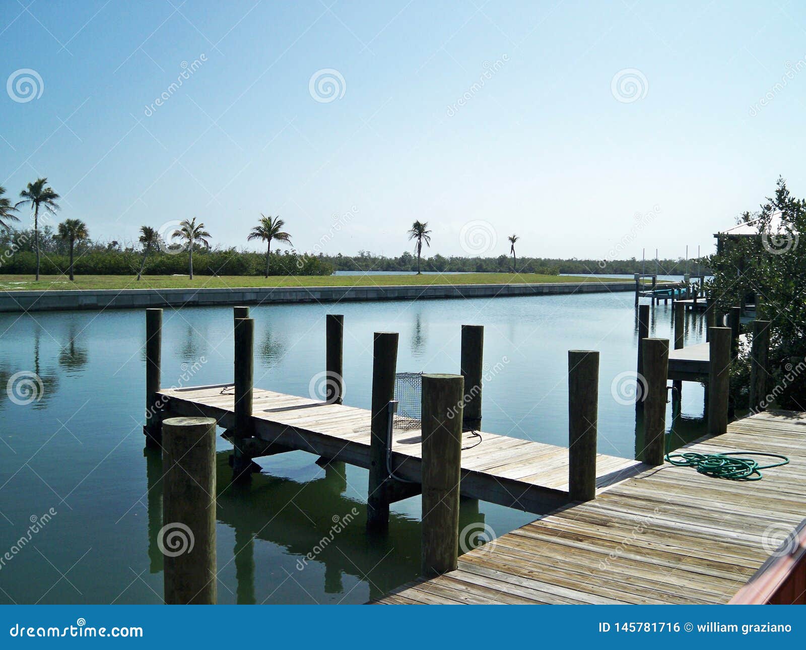Dock on the Water on Pleasant Sunny Day. Stock Photo - Image of ...