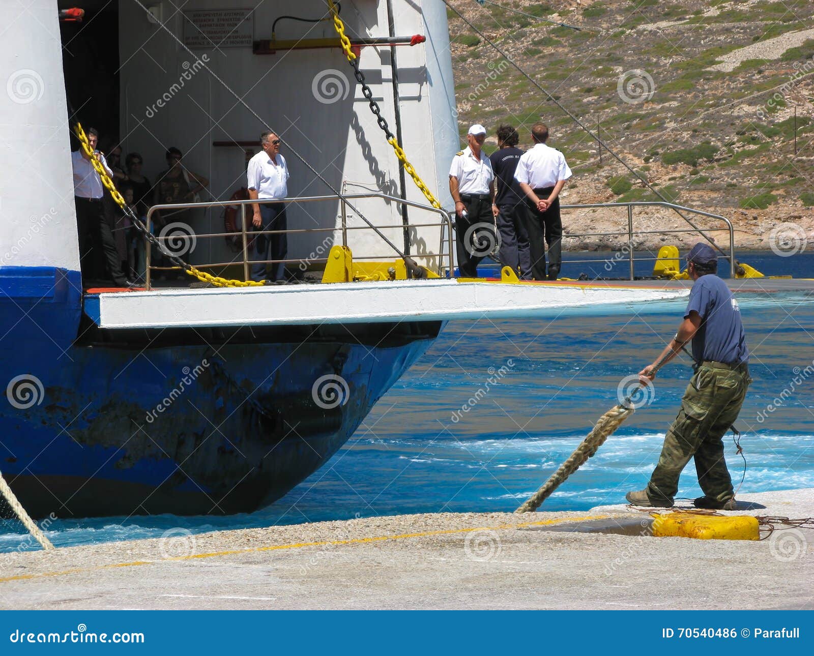 Dock worker in action editorial photo. Image of island - 70540486