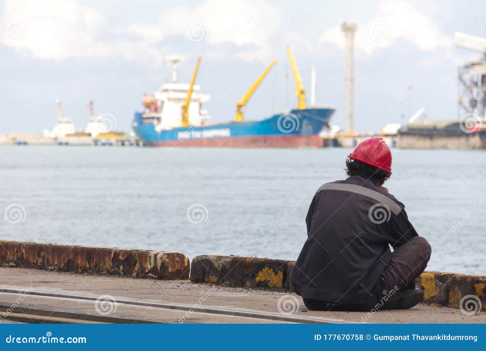 Dock Worker Finishing Work Sitting at the Port Stock Photo - Image of ...