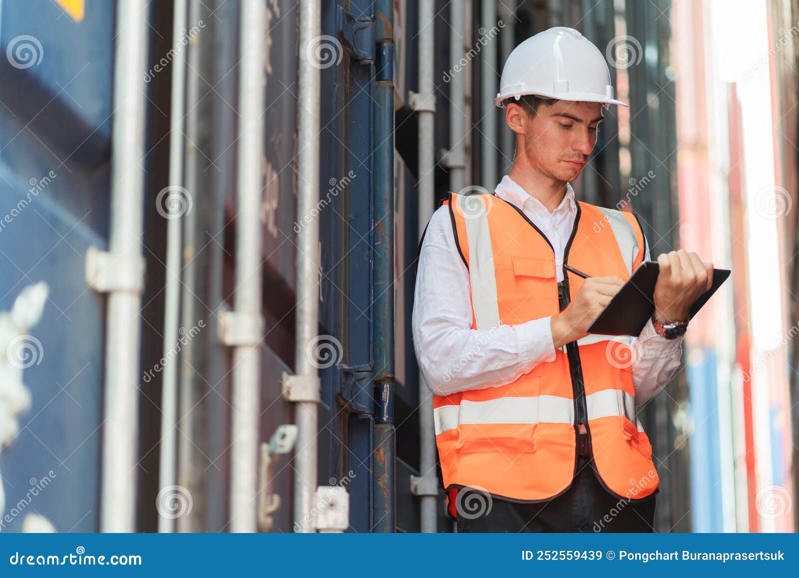 Dock Worker Man in Safety Vest Take Note on Tablet. Checking Defect in ...