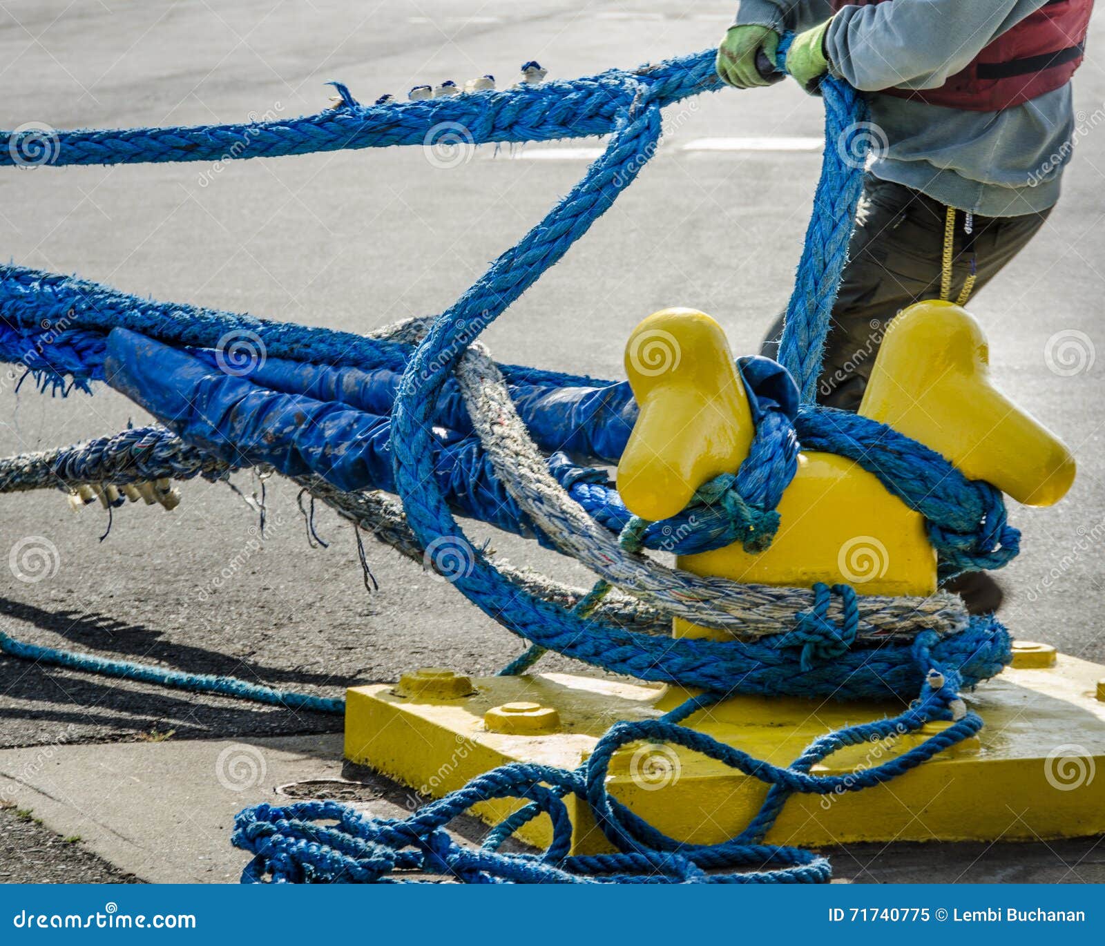 Dock Worker Pulling on Ropes Stock Image - Image of marine, marina ...