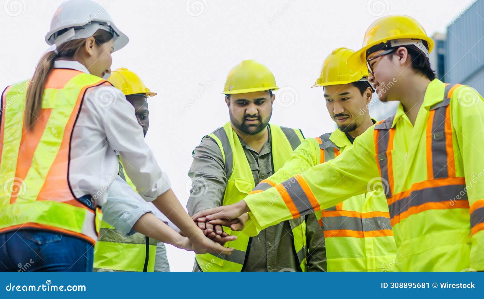 Dock Workers Stand with Their Hands Together in the Container Terminal ...