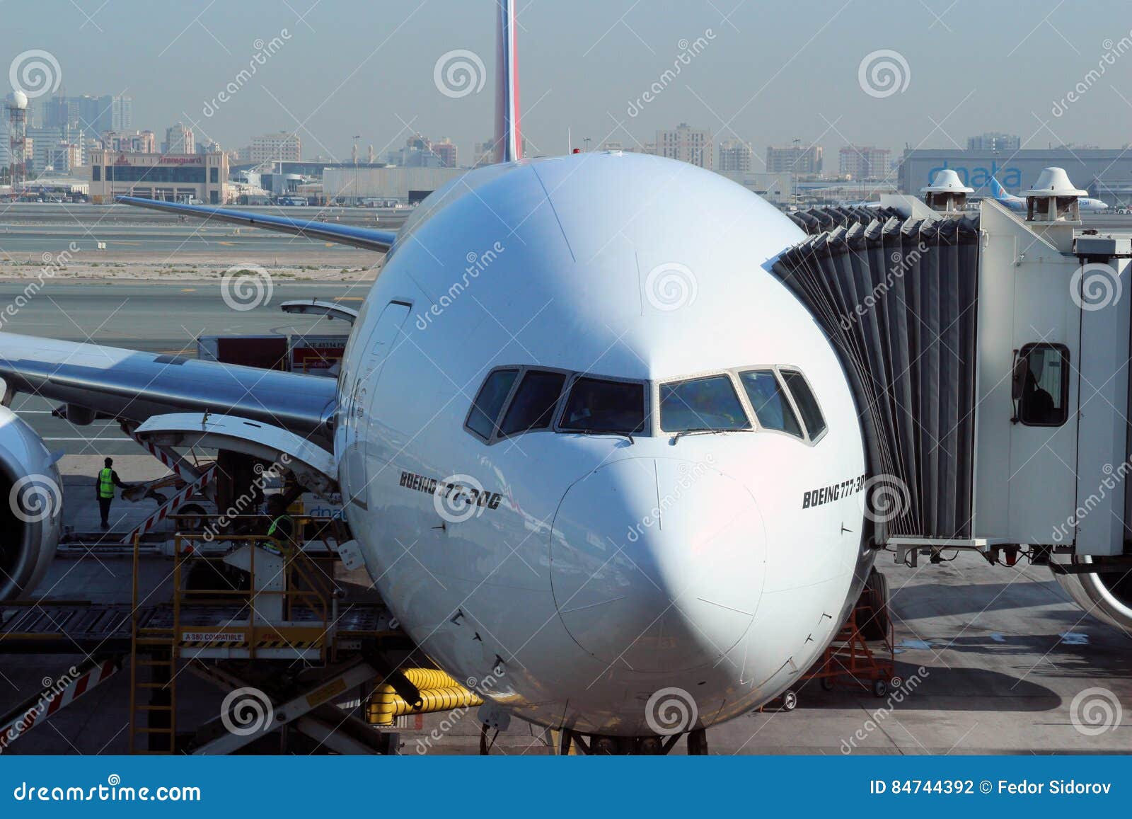 A docked Boeing 777 plane editorial photography. Image of emirates ...