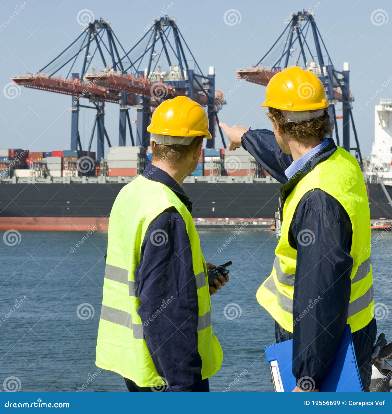 Dockers in discussion stock image. Image of hard, note - 19556699