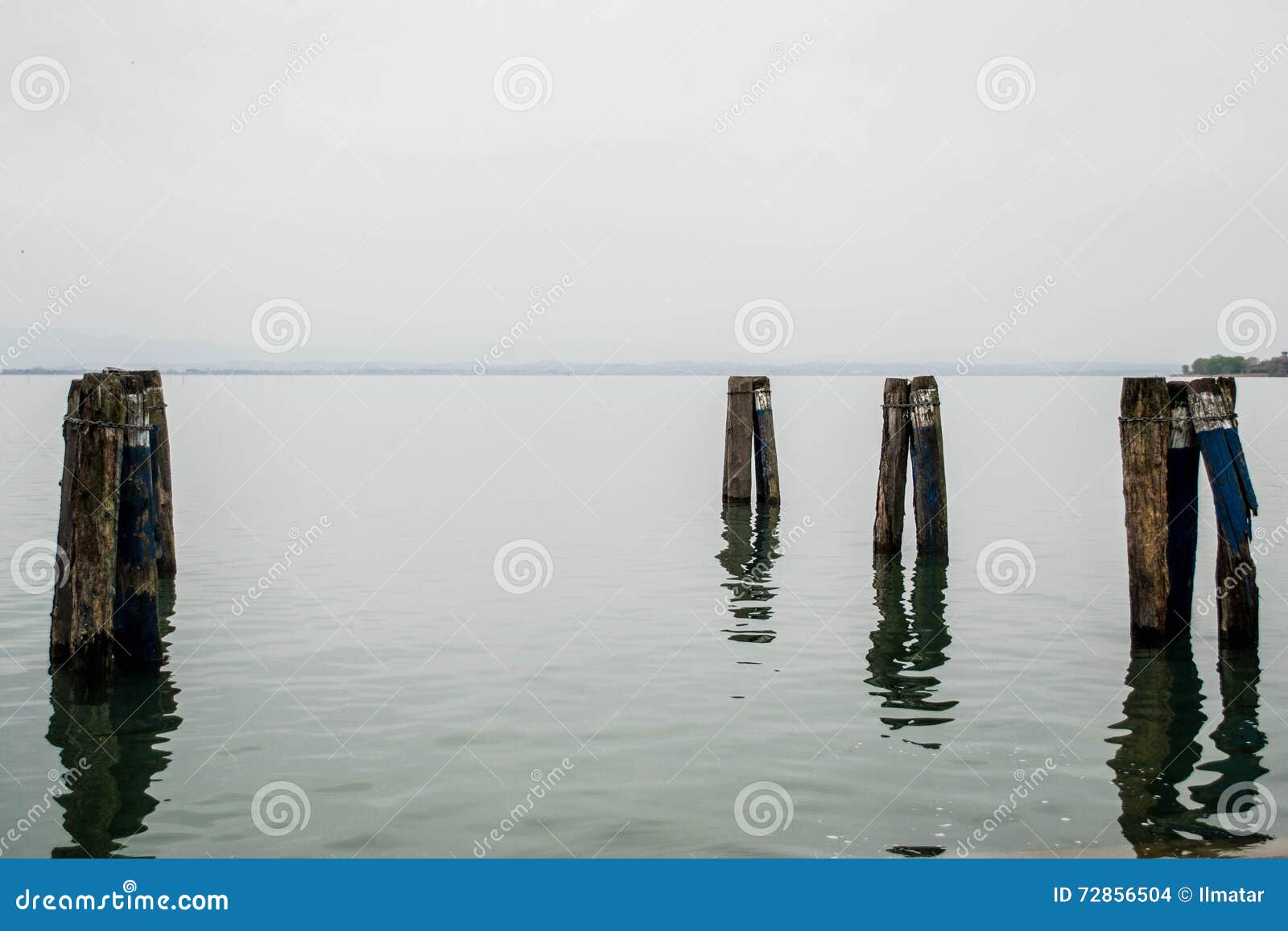 Docks on the lake stock photo. Image of poles, painted - 72856504