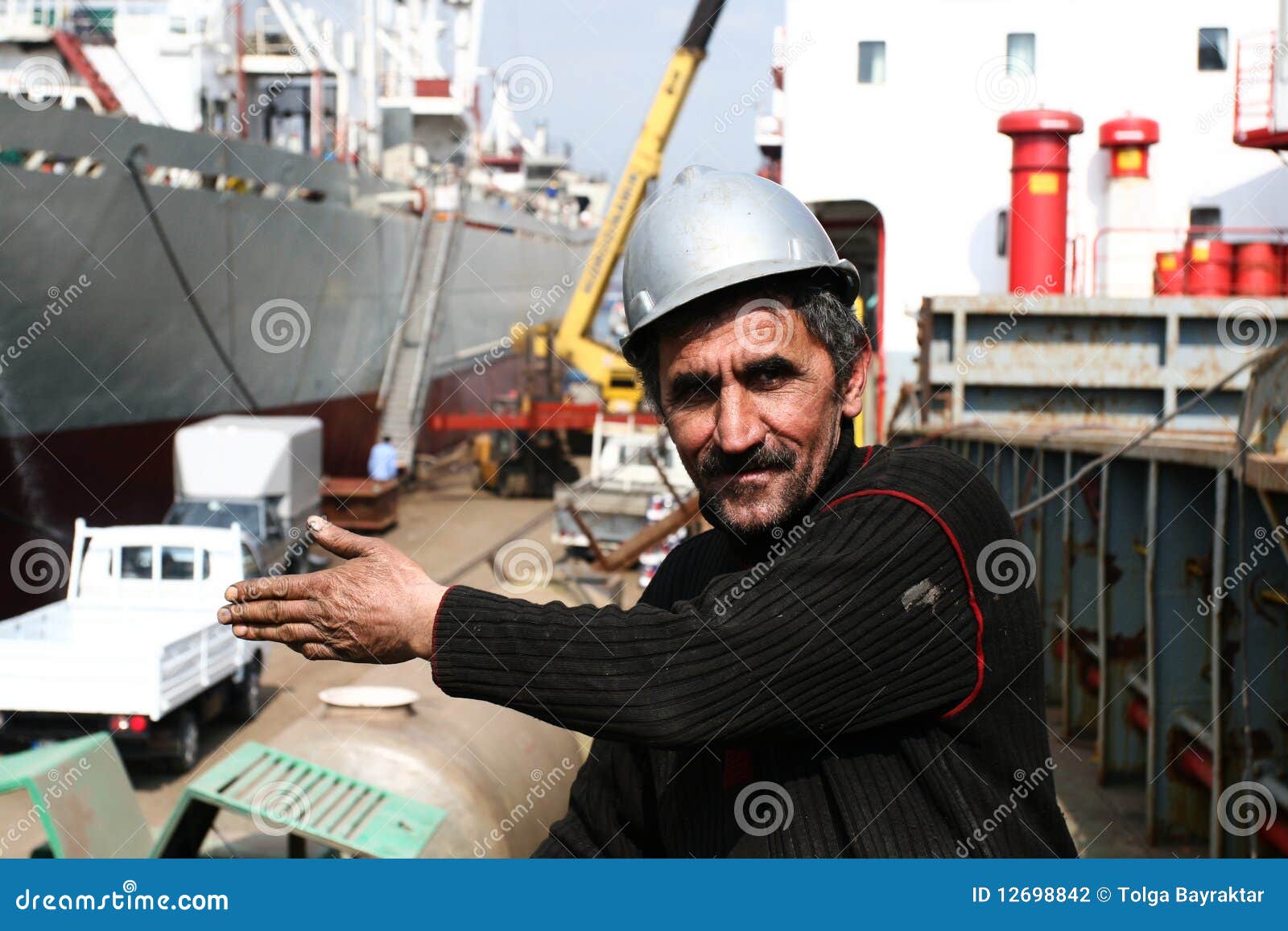 Dockyard Worker Showing Something Stock Photo - Image of human, vessel ...