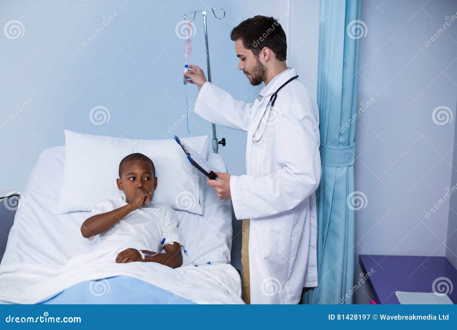 Doctor Adjusting Iv Drip while Patient Lying on Bed Stock Image - Image ... Doctor Adjusting Iv Drip while Patient Lying on Bed Stock Image - Image ...