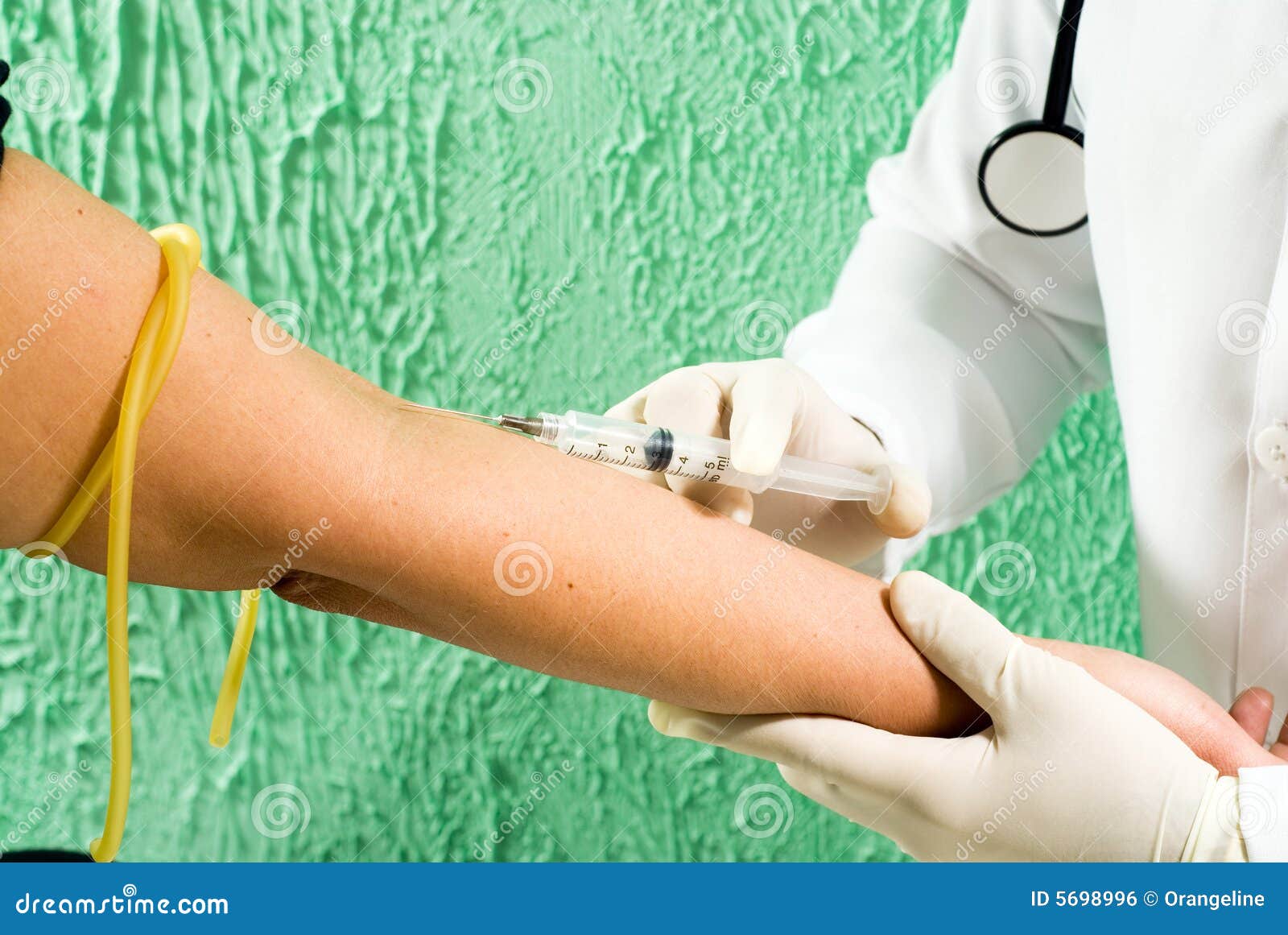 Doctor Administers Shot To Patient - Horizontal Picture. Image: 5698996