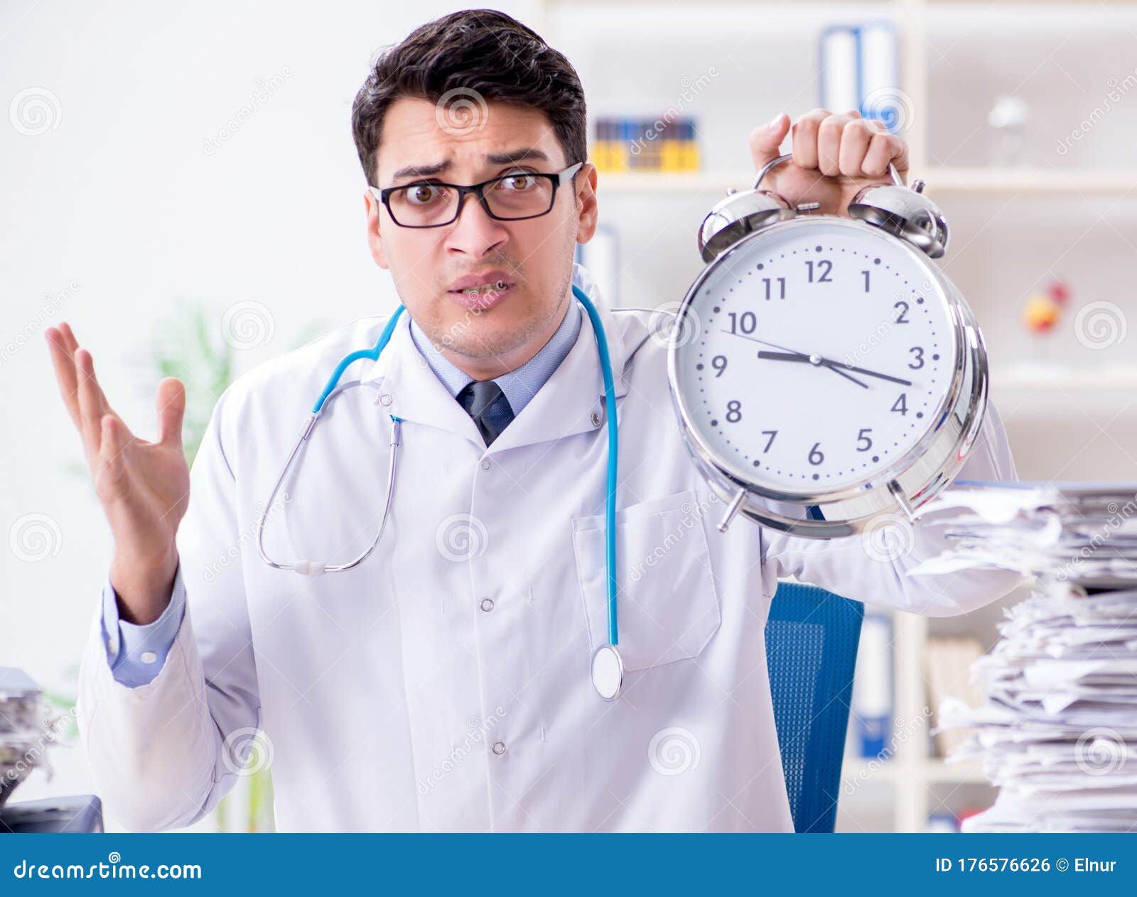 Doctor with Alarm Clock in Urgent Check-up Concept Stock Photo - Image ...