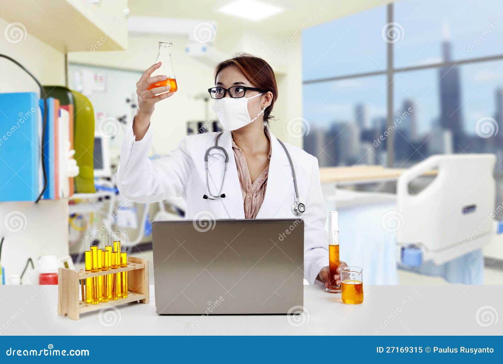 Doctor Analyzing Yellow Solution at the Hospital Stock Image - Image of ...