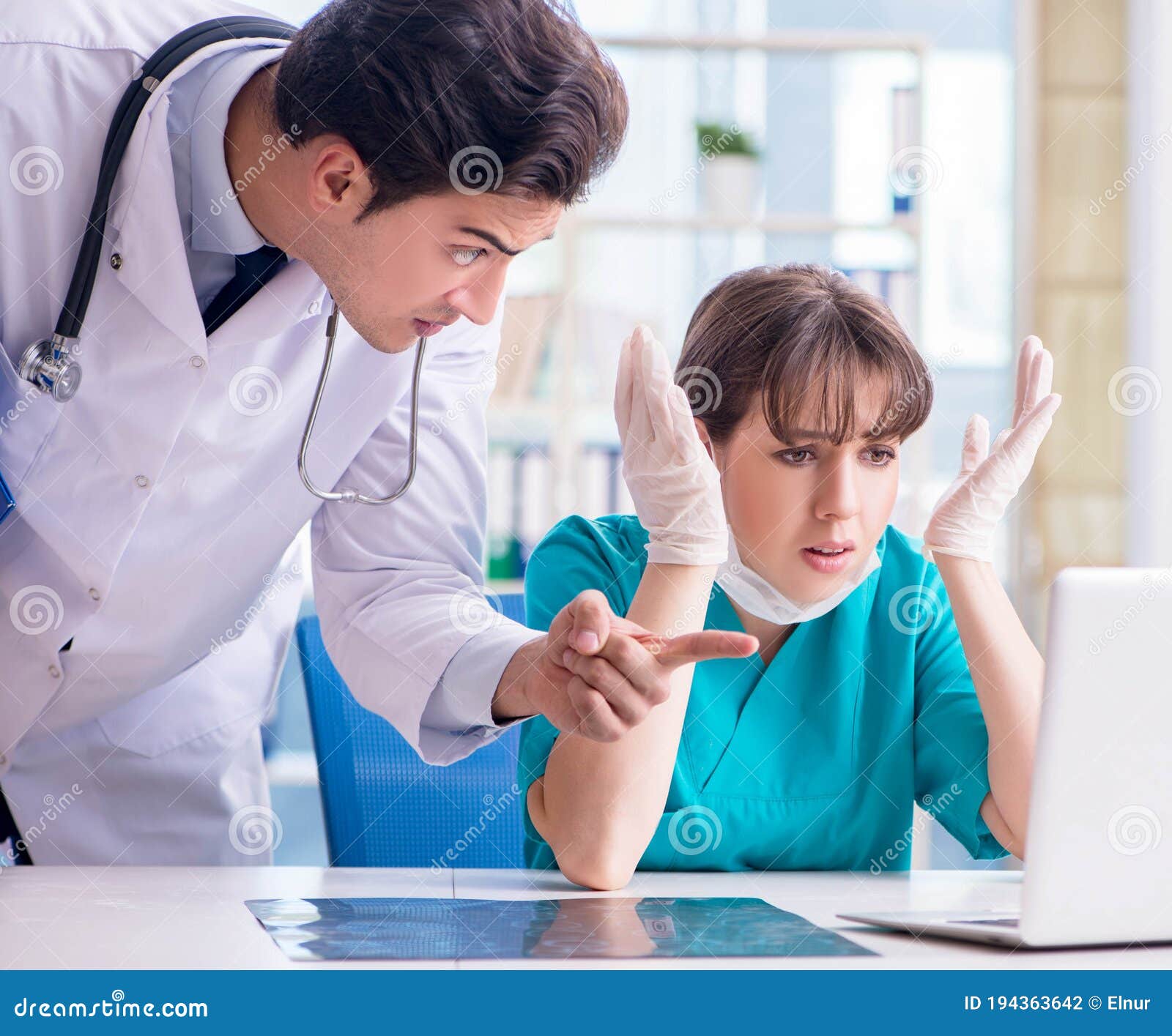 Doctor Angry at His Assistant Due To Medical Error Stock Photo - Image ...