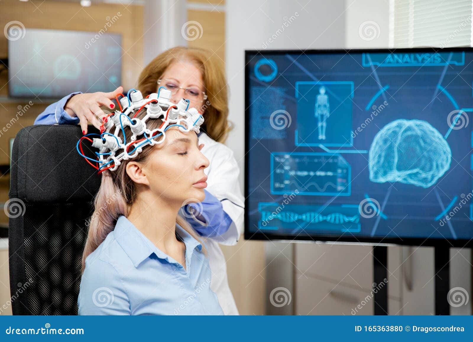Doctor Arranging Scanning Device on Head of a Female Patient Stock ...