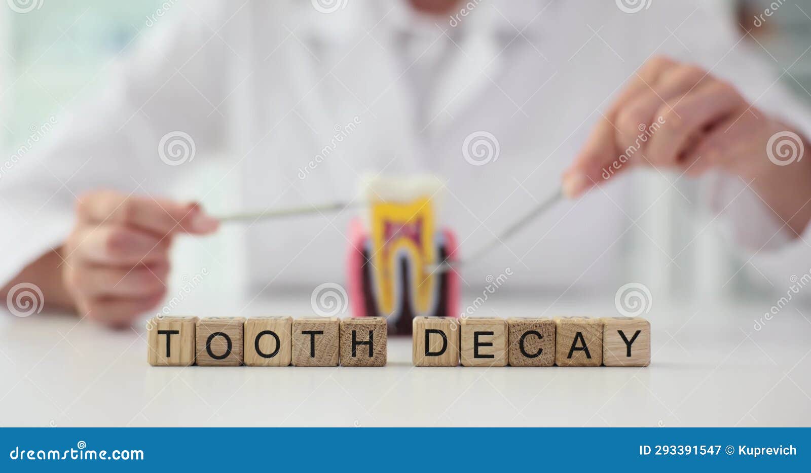 Doctor and Artificial Tooth Model Using Dental Instruments Word Tooth ...