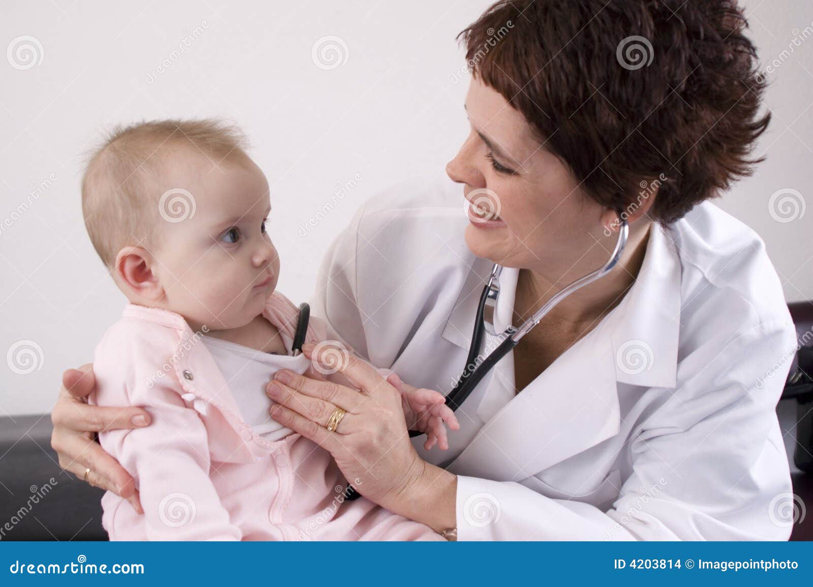 Doctor with baby stock photo. Image of adorable, wellness - 4203814