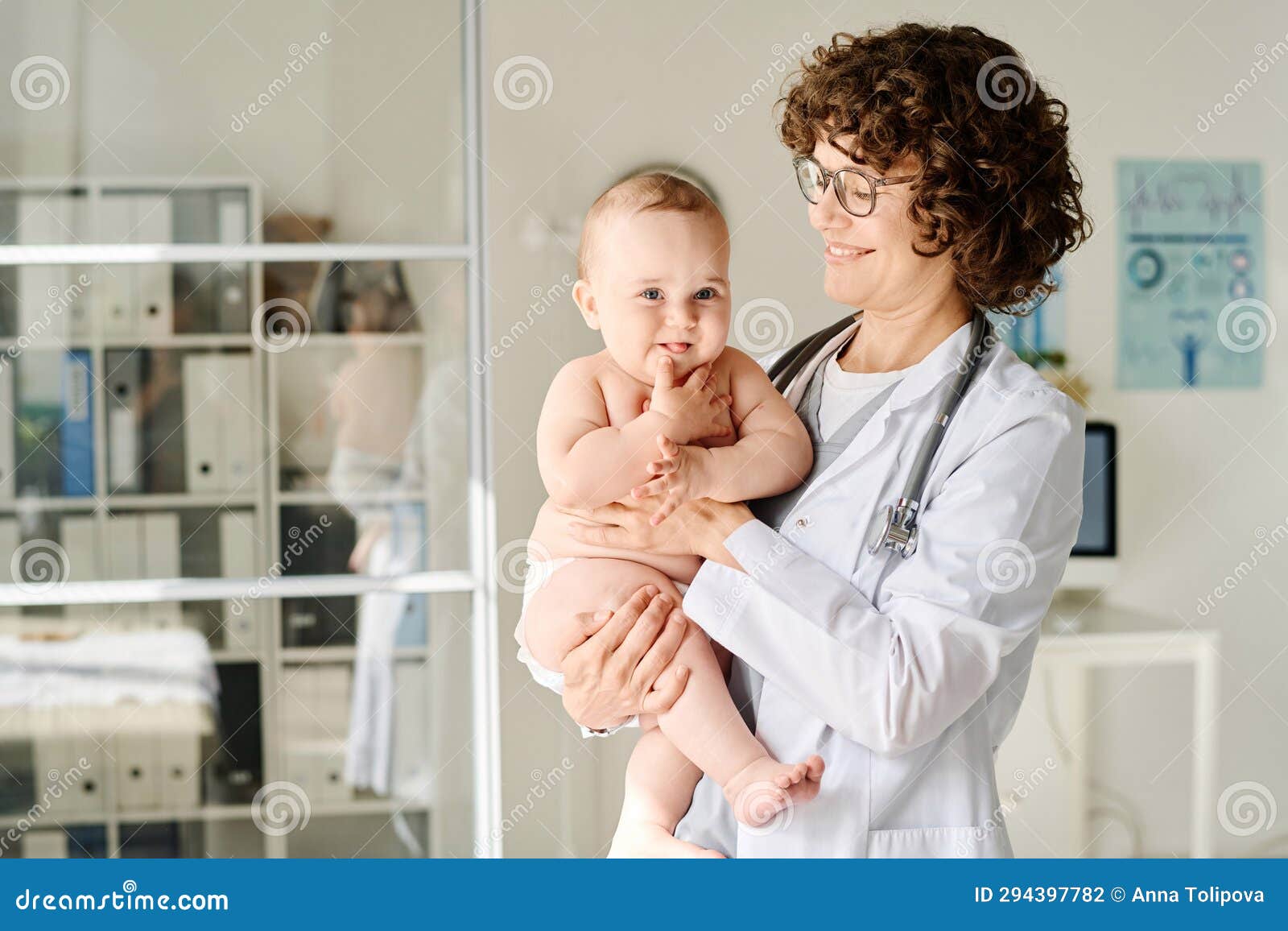 Doctor with Baby at Hospital Stock Photo - Image of smile, baby: 294397782