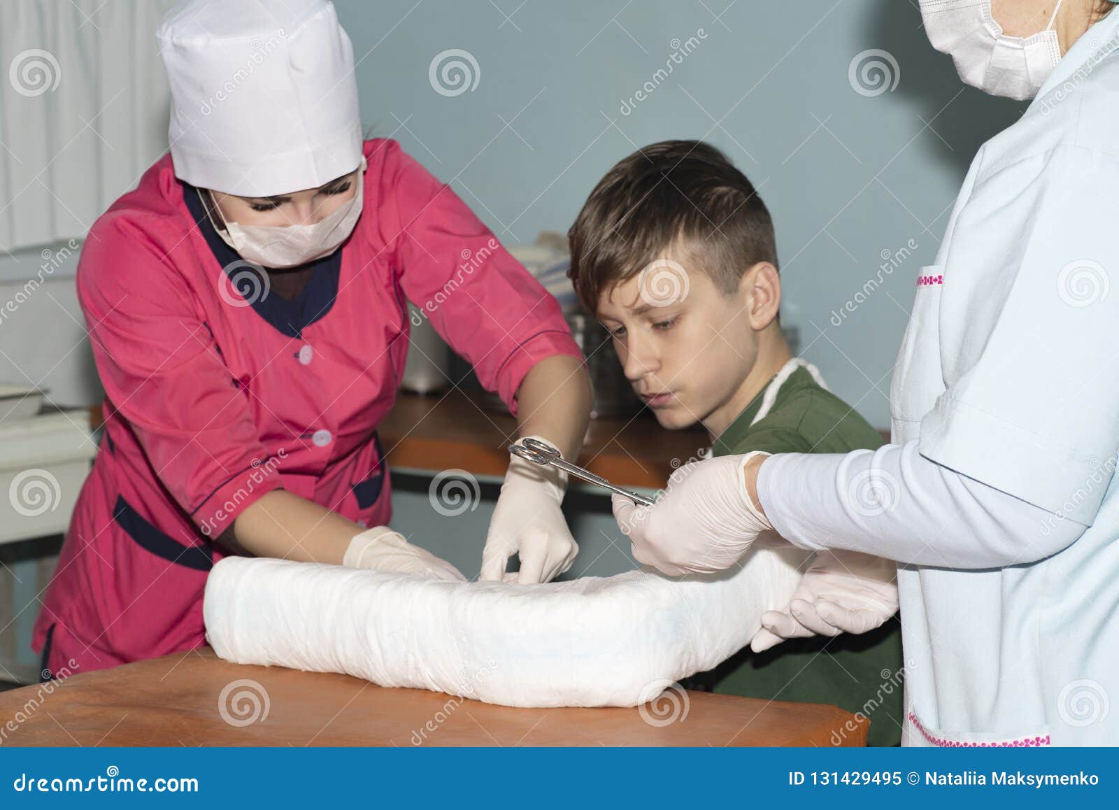 Doctor Bandages a Broken Arm To a Boy Stock Image - Image of patient ...
