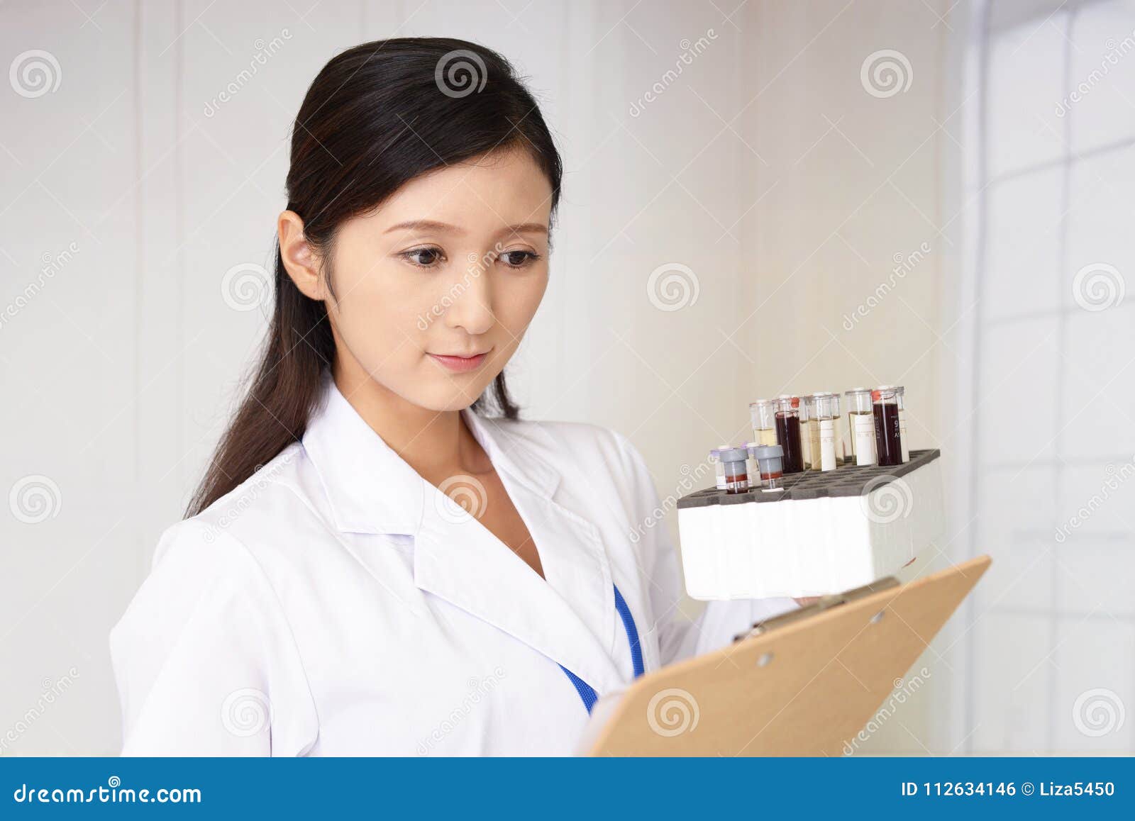 Doctor with blood samples stock photo. Image of diagnosis - 112634146