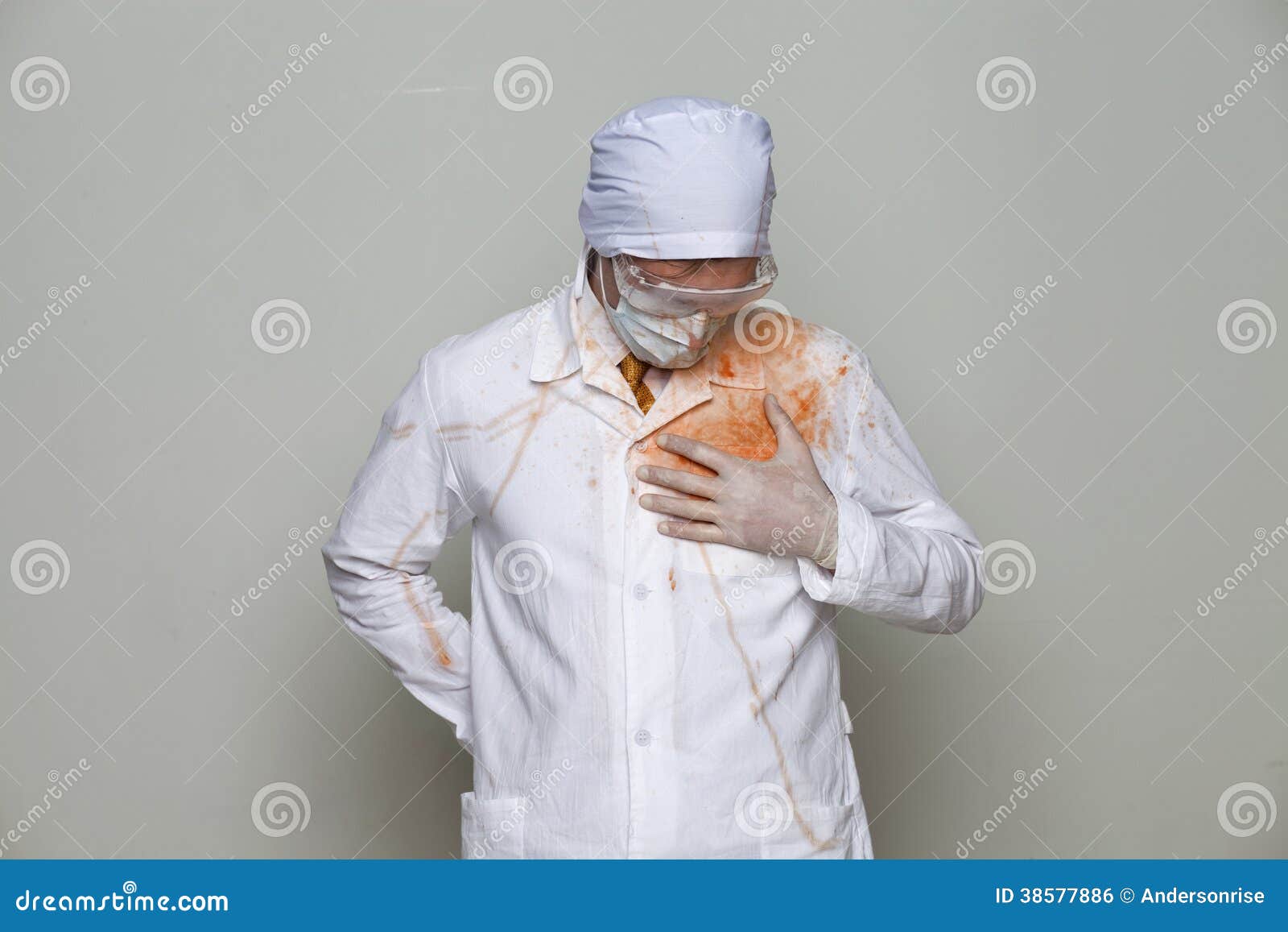 Doctor in a bloody robe stock photo. Image of medical - 38577886