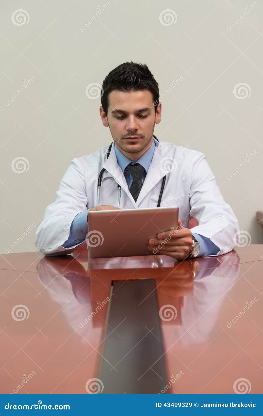 Doctor on a Break with His Computer Stock Image - Image of male ...
