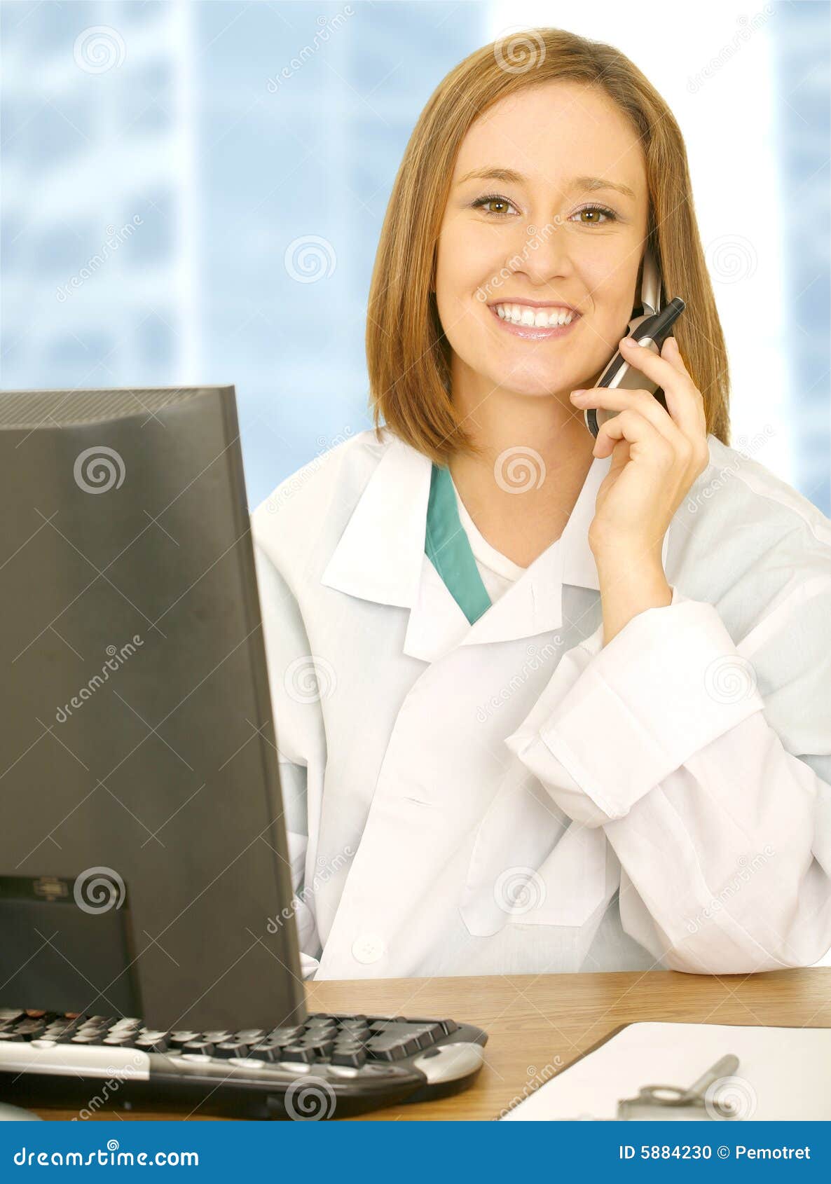 Doctor Calling on Her Desk stock photo. Image of beautiful - 5884230