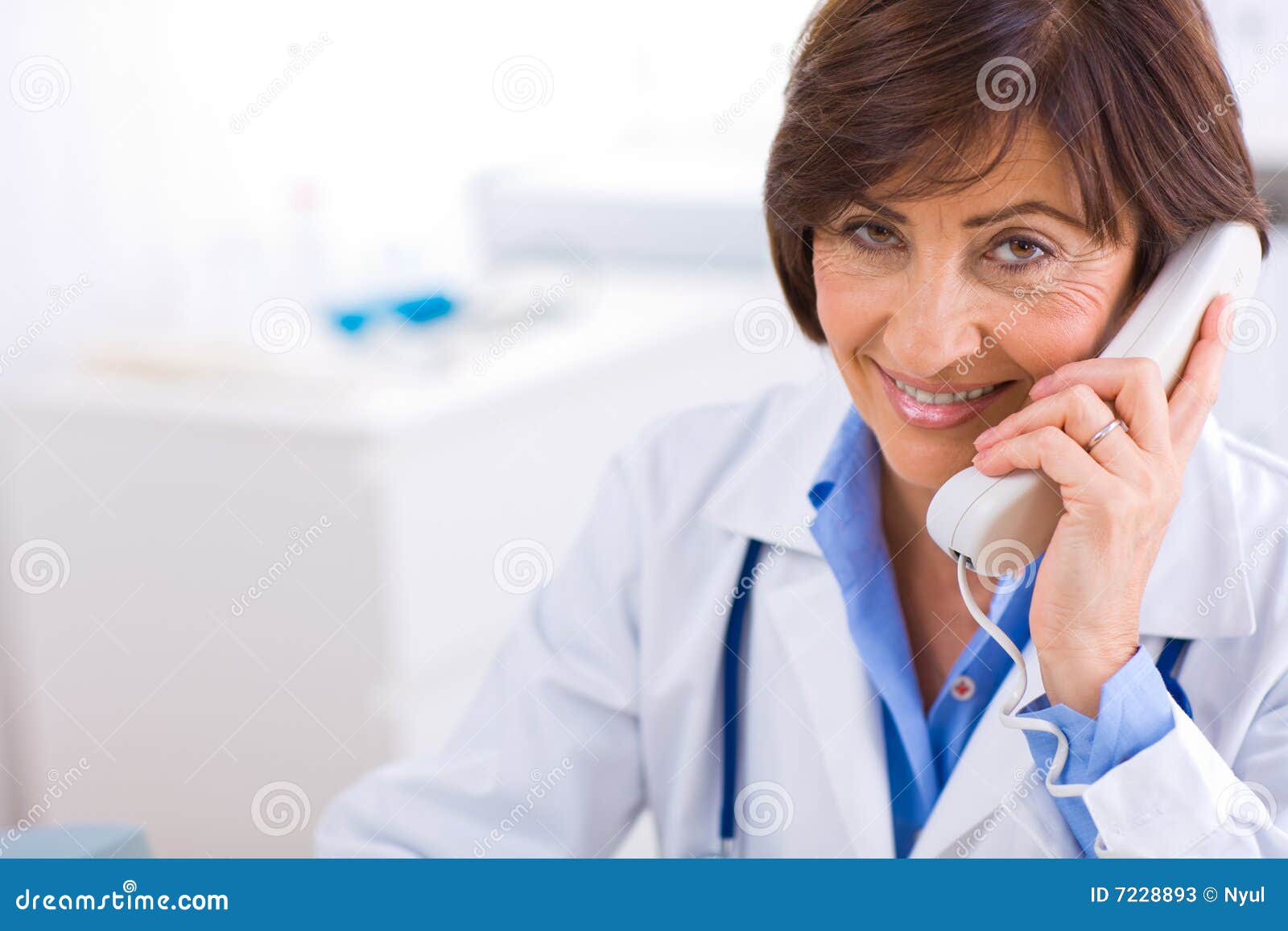 Doctor calling on phone stock image. Image of exam, calling - 7228893