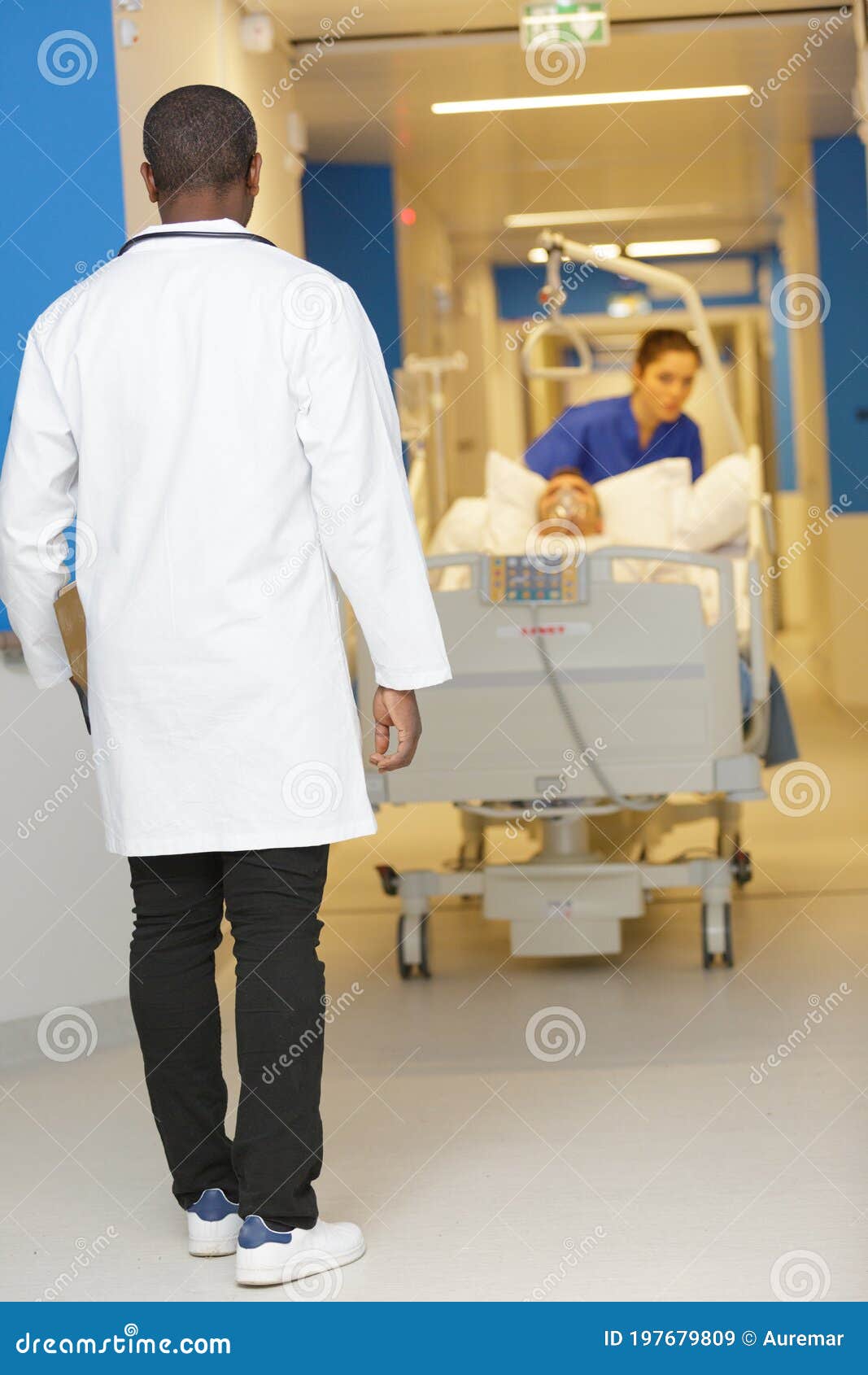 Doctor carries patient stock image. Image of nurse, medicine - 197679809