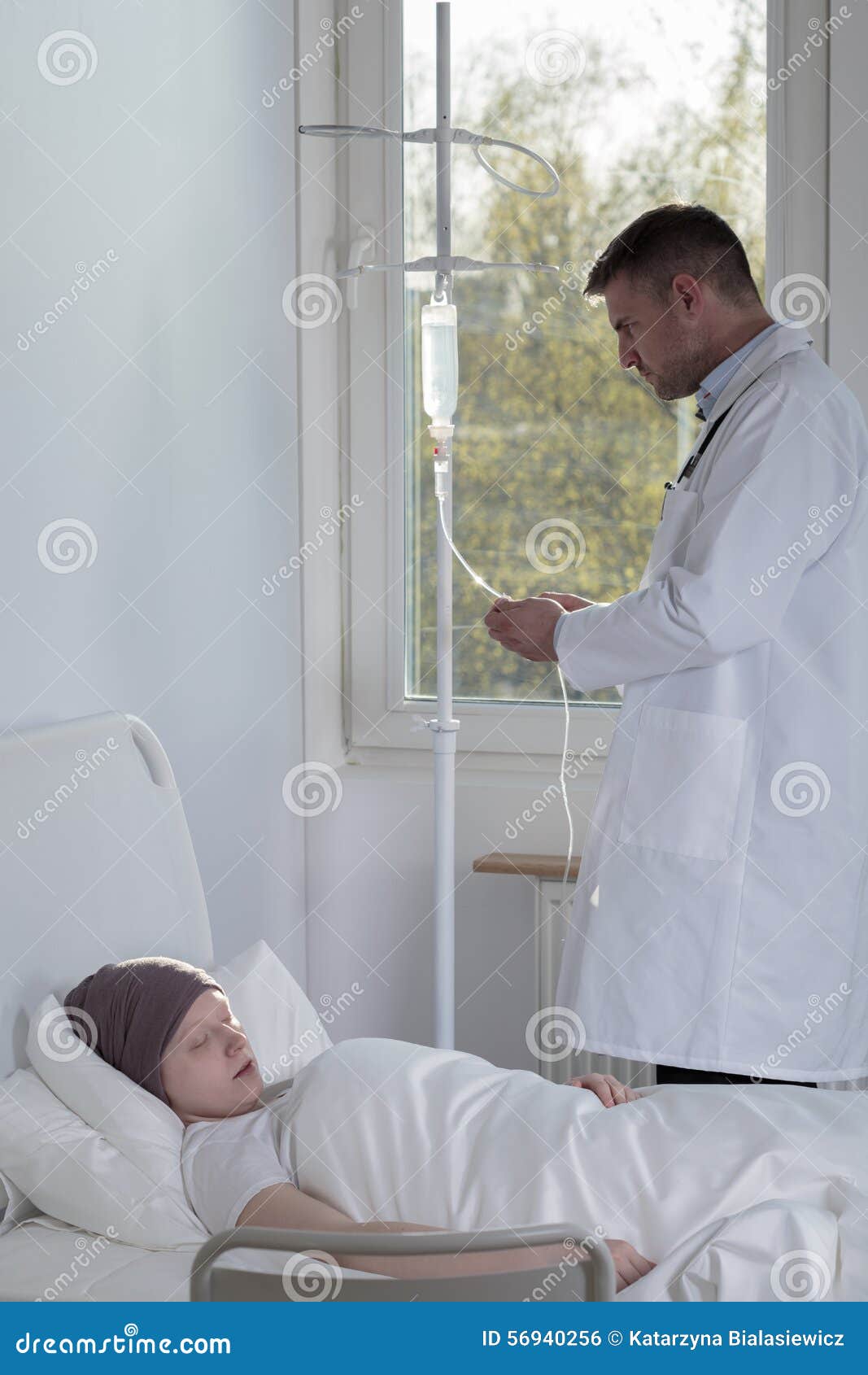 Doctor changing the drip stock photo. Image of change - 56940256
