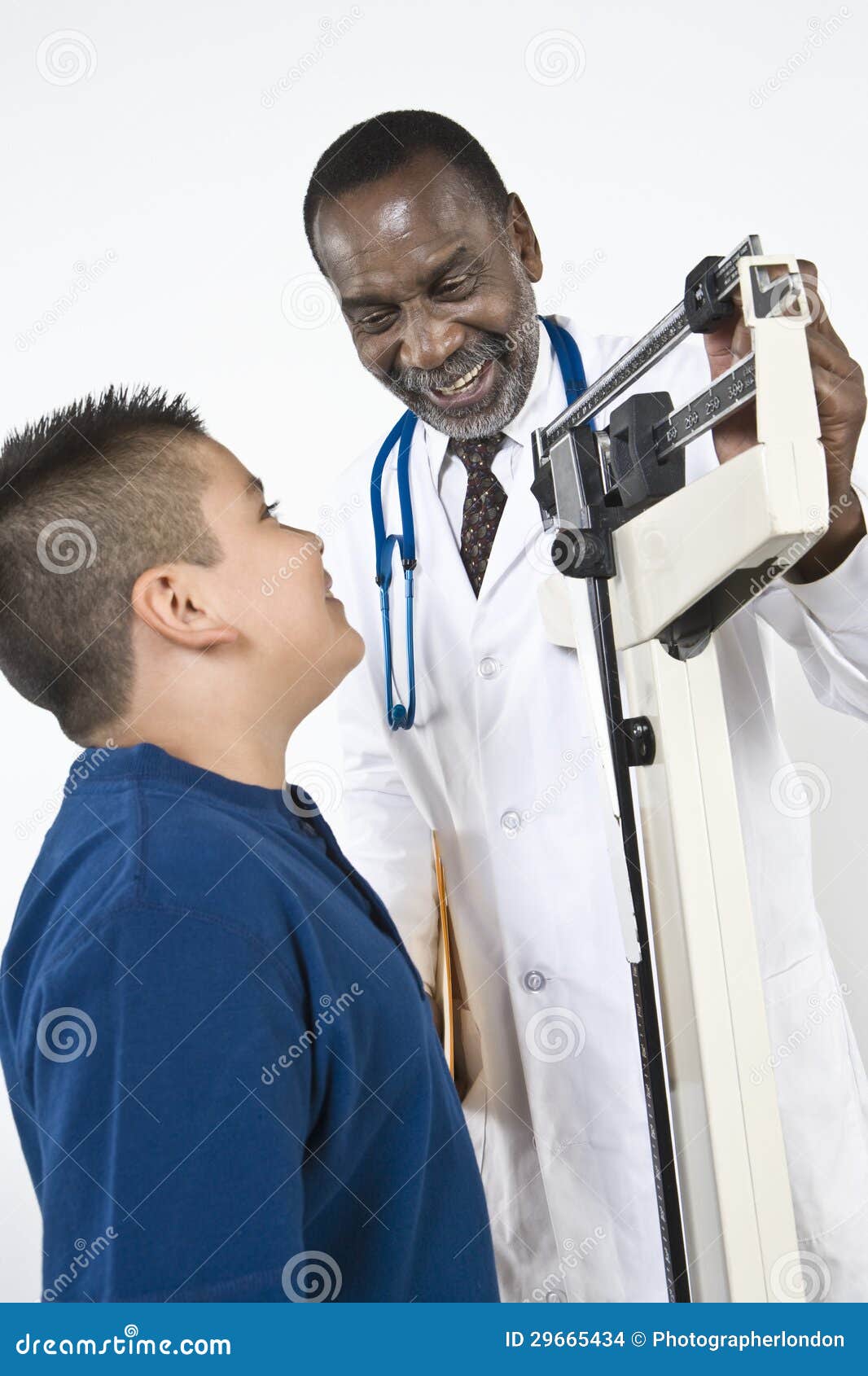 Doctor Checking Boy S Weight Stock Photo - Image of hispanic, boomer ...