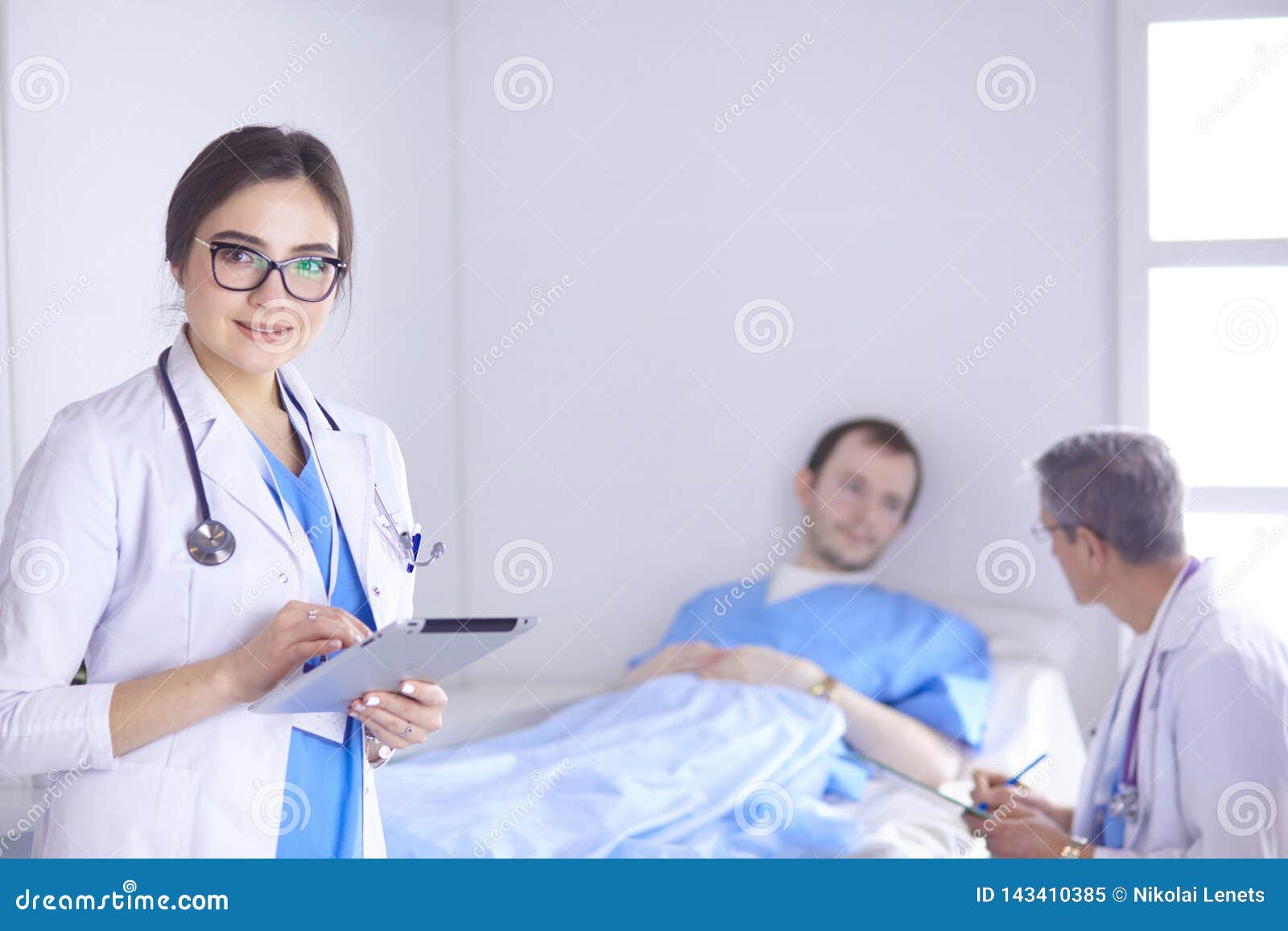Doctor Checking Heart Beat of Patient in Bed with Stethoscope Stock ...