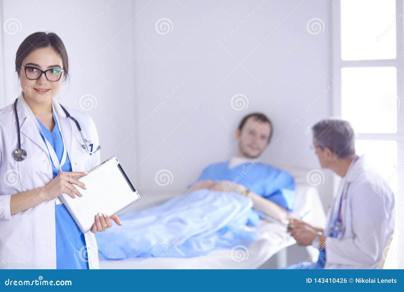 Doctor Checking Heart Beat of Patient in Bed with Stethoscope Stock ...
