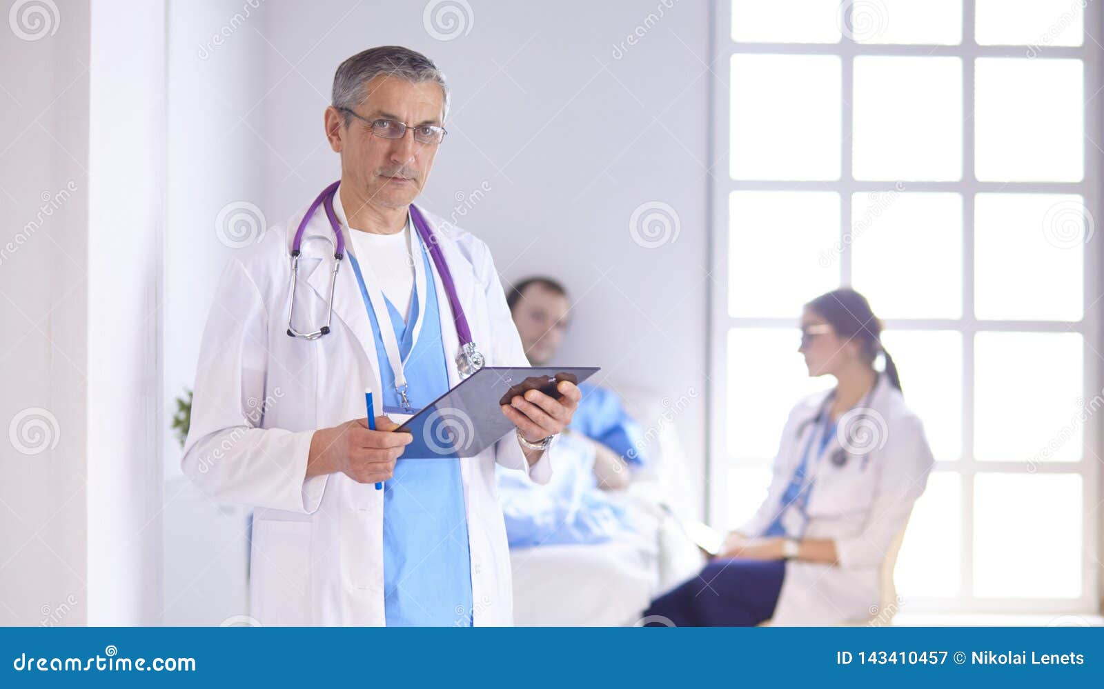 Doctor Checking Heart Beat of Patient in Bed with Stethoscope Stock ...