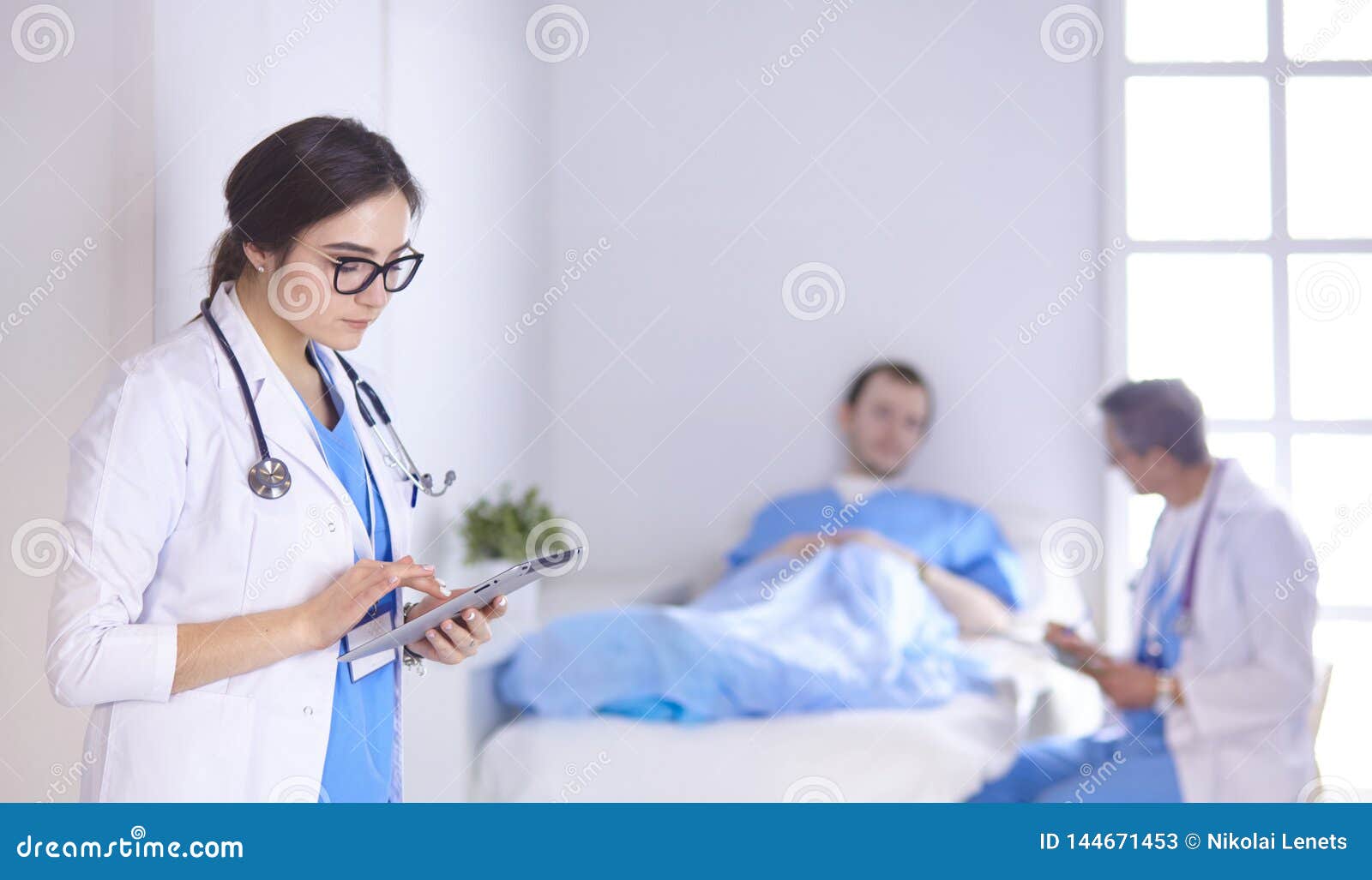 Doctor Checking Heart Beat of Patient in Bed with Stethoscope Stock ...