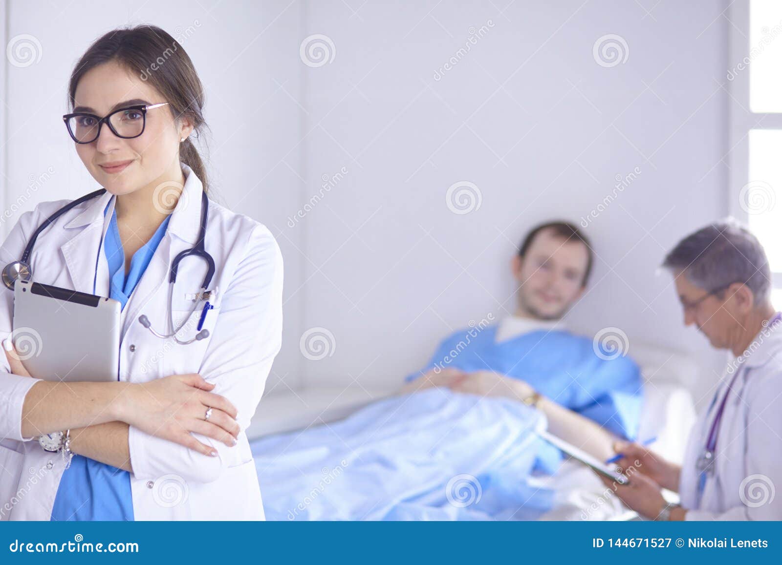 Doctor Checking Heart Beat of Patient in Bed with Stethoscope Stock ...